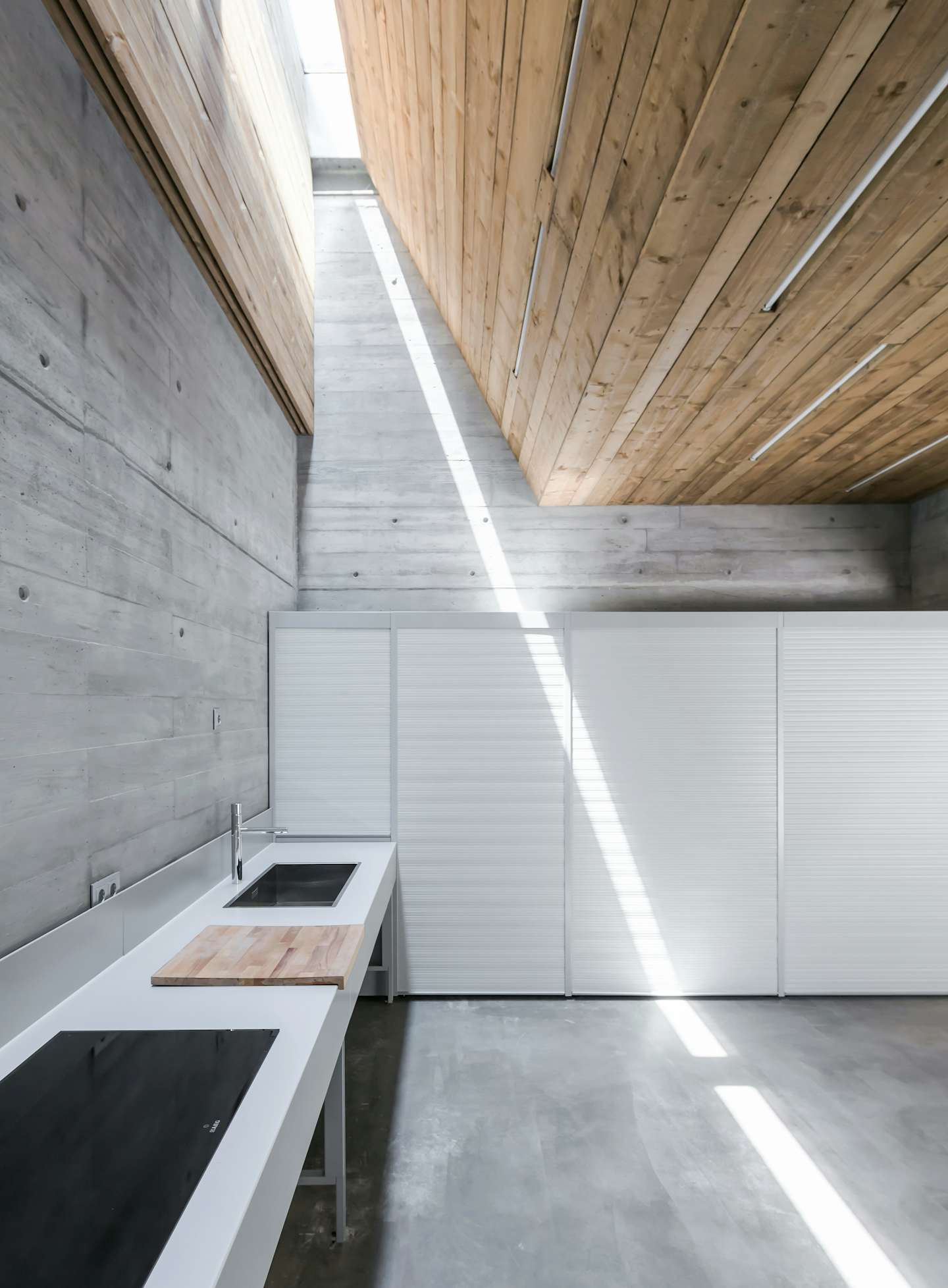 A Half-Buried Home Fights for Sunlight - Dwell