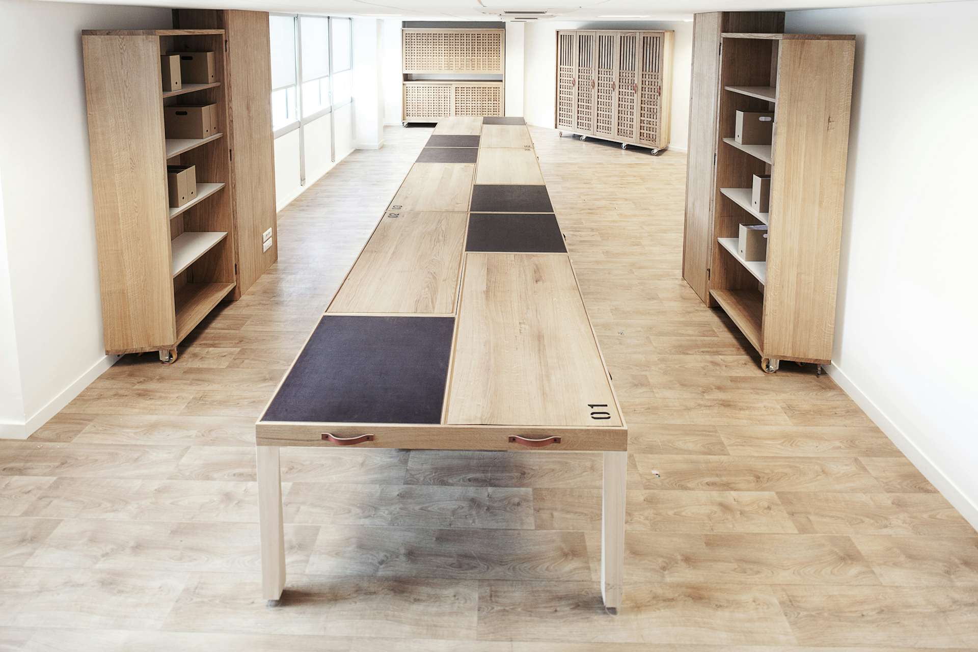 A Modular Meeting Room Features a Table with 6 Possible Layouts - Dwell