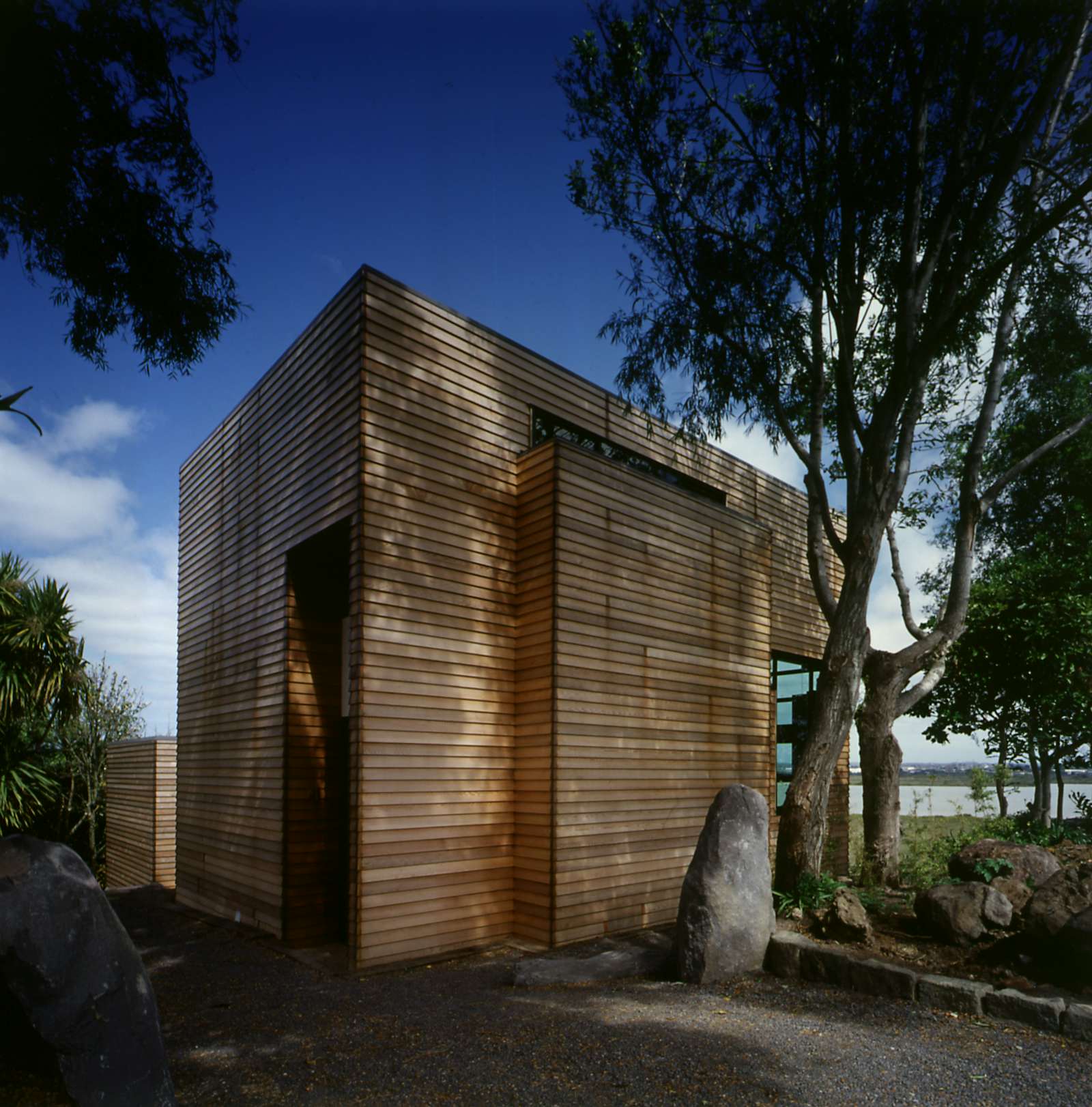 This Japanese-Style Box Home Boasts a Two-Story Bookcase - Dwell