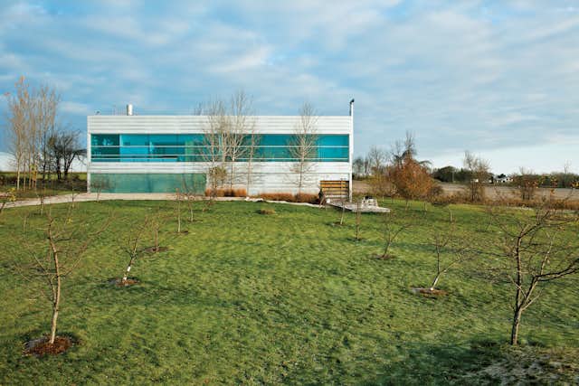 Photo 9 of 10 in An Architect References Local Architecture to Build a ...