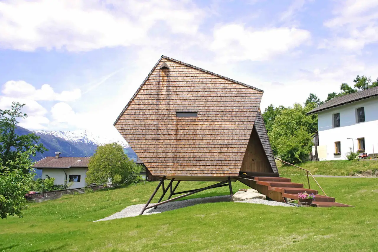 Stay in a Tiny Shingled Cabin in Austria That Resembles a Bird-Like UFO ...
