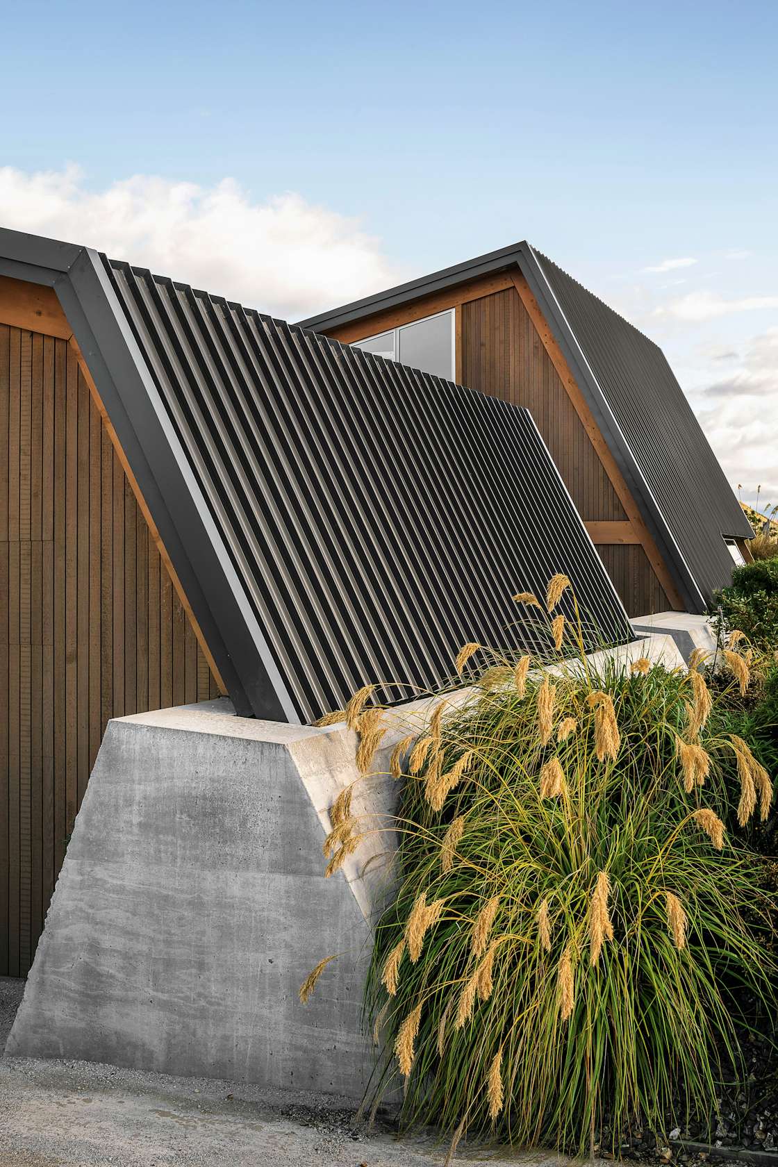 Photo 3 of 9 in This Bunker-Like Home in New Zealand Fights Back ...