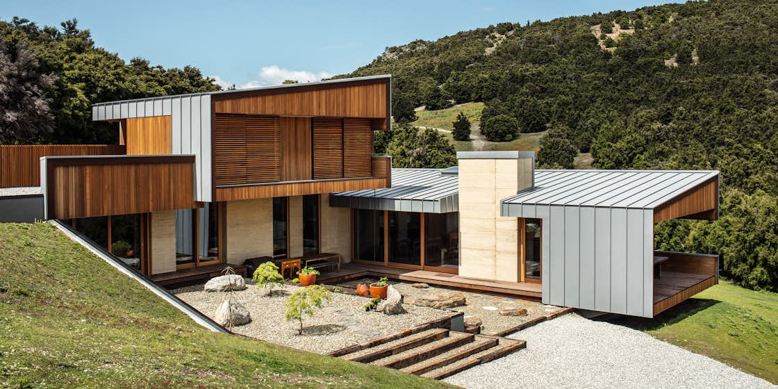 Photo 1 of 23 in A Rammed Earth Home Rises on a Breathtaking Site in ...