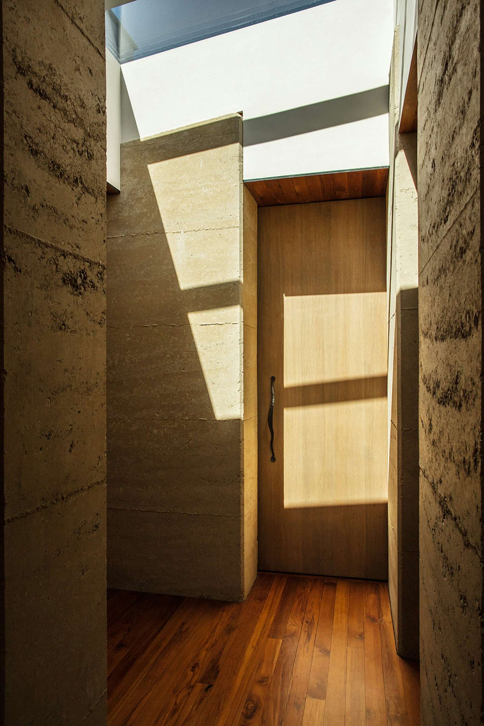 Photo 18 of 23 in A Rammed Earth Home Rises on a Breathtaking Site in ...