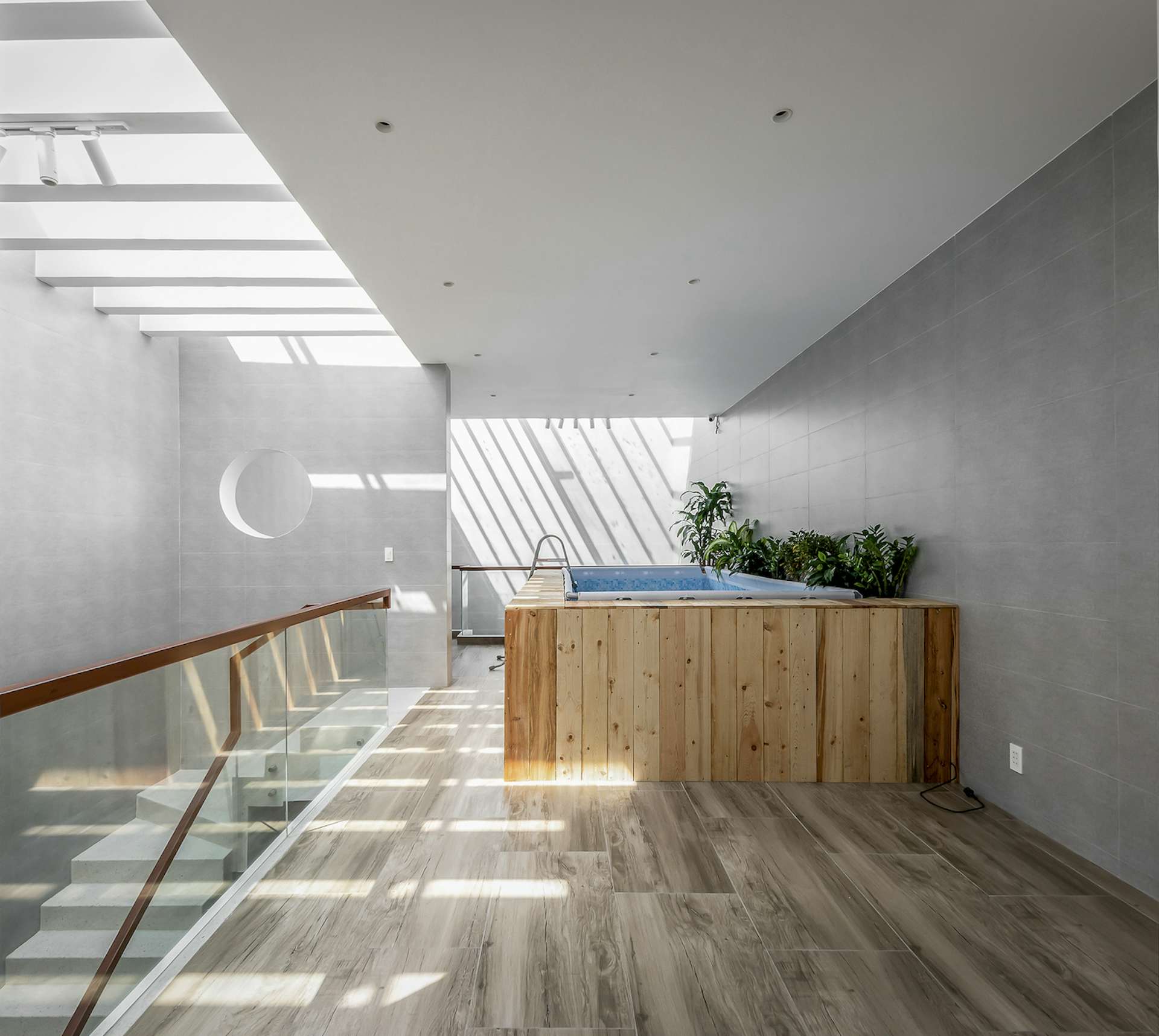 Photo 10 of 13 in A Light-Filled Atrium With a Tree House Anchors a ...