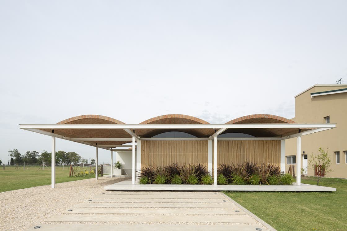 Photo 2 of 15 in A Rippling Brick Roof Caps a Sun-Kissed Home in ...