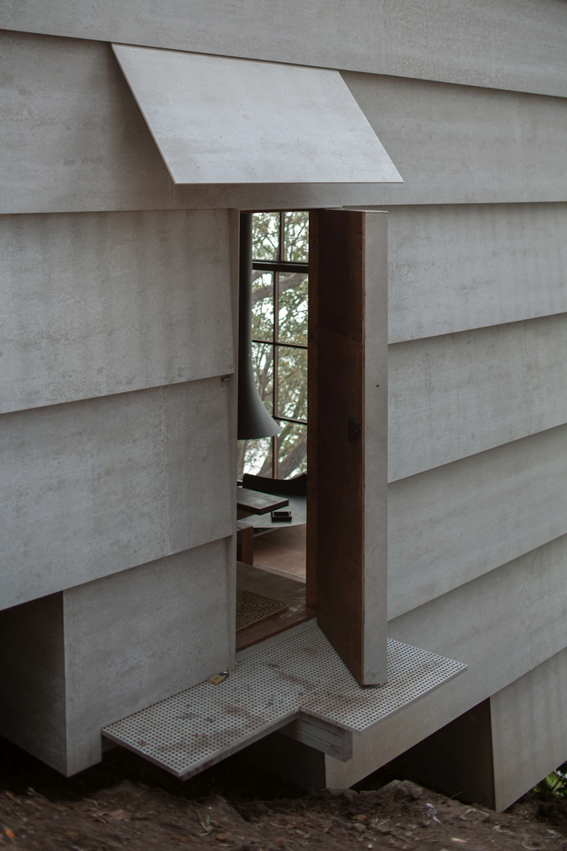 Photo 1 of 11 in A Massive Glass Front Slides Open at This Off-Grid ...