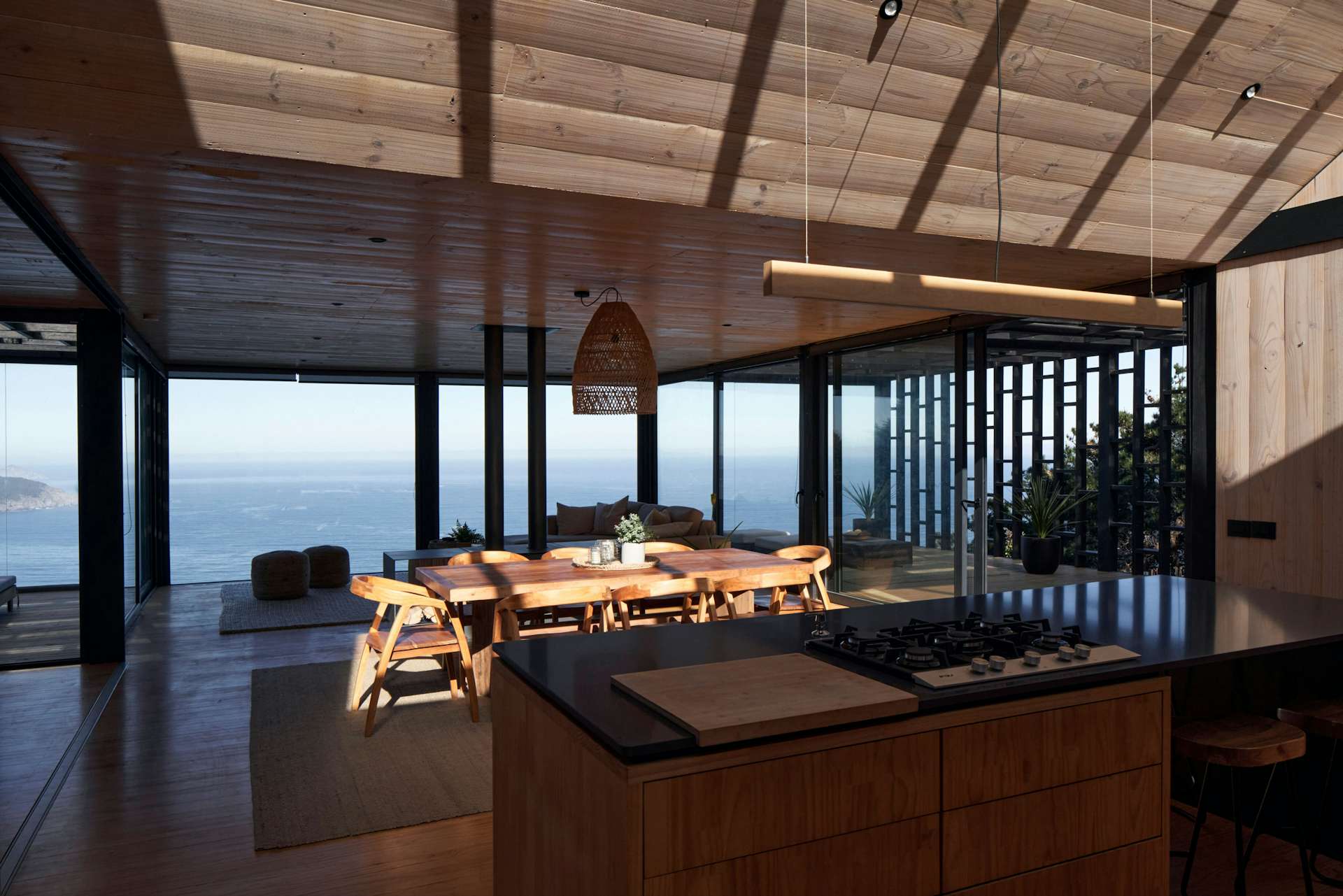 Photo 2 of 11 in A Surfer Couple Build an All-Black Off-Grid Cabin on a ...