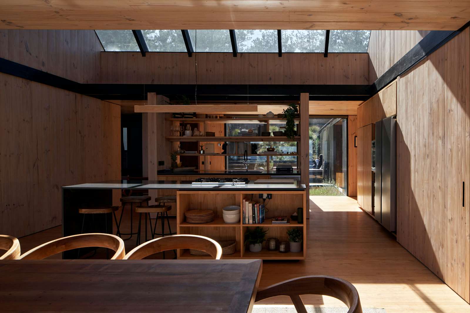 Photo 5 of 11 in A Surfer Couple Build an All-Black Off-Grid Cabin on a ...