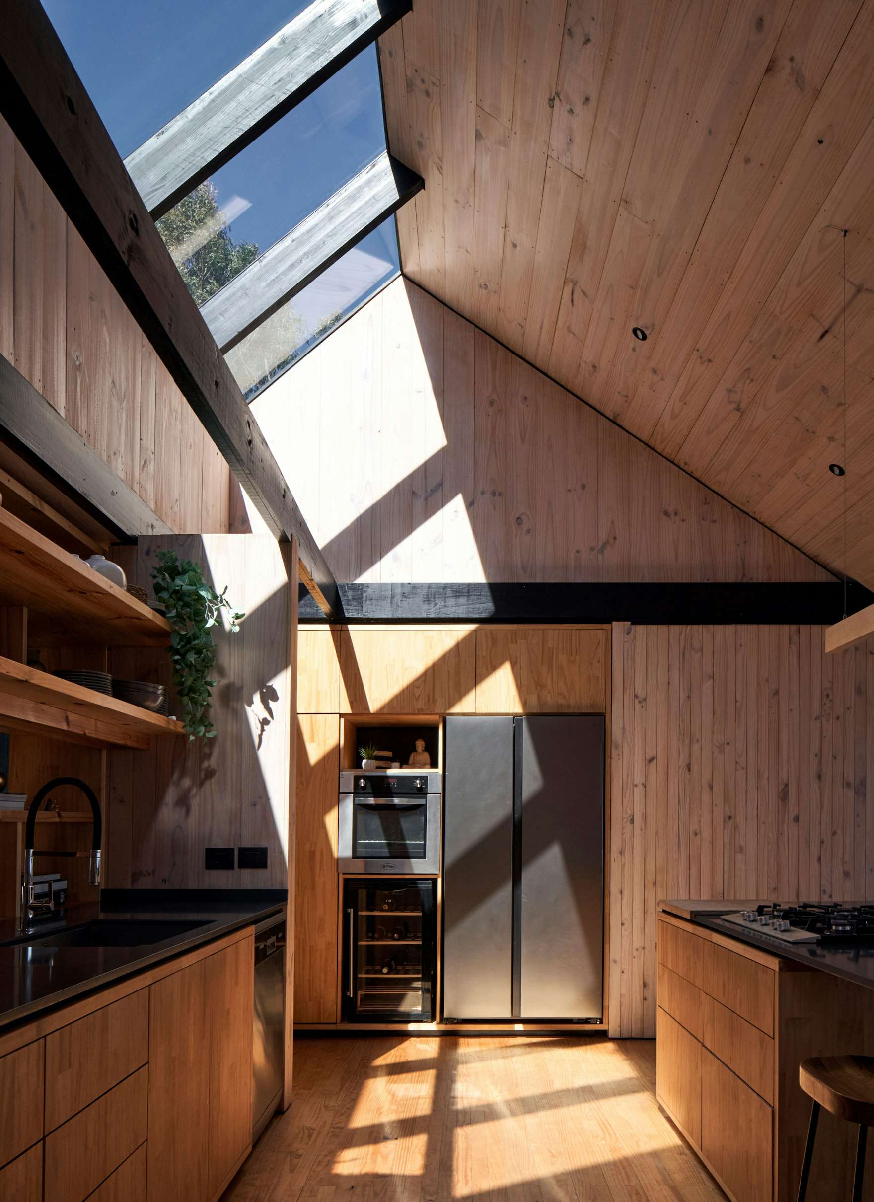 Photo 6 of 11 in A Surfer Couple Build an All-Black Off-Grid Cabin on a ...