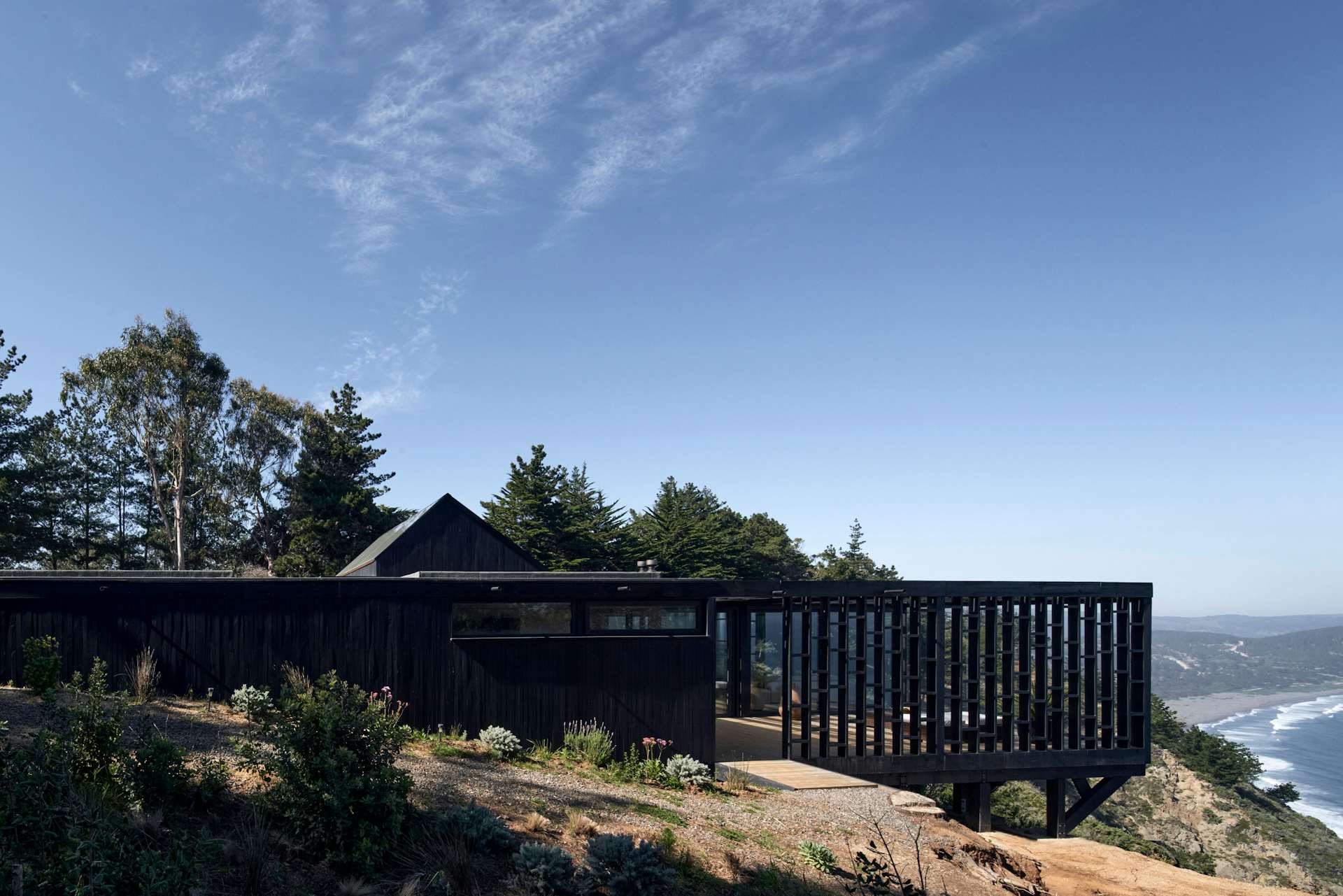 Photo 10 of 11 in A Surfer Couple Build an All-Black Off-Grid Cabin on ...