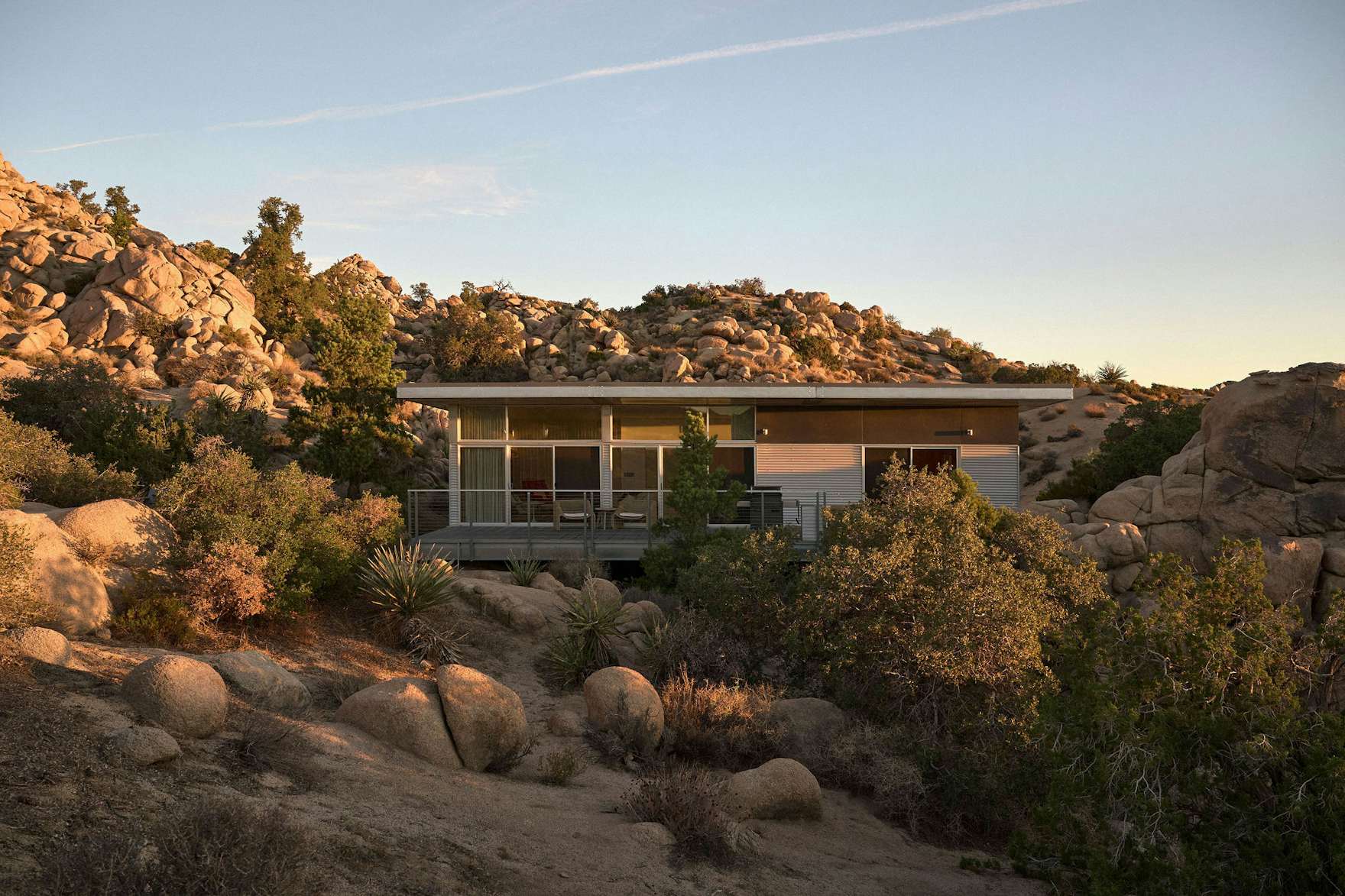Photo 1 of 12 in A Prefab Home Takes Shape Among the Boulders of Yucca ...