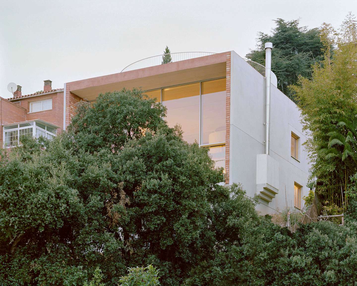 Photo 1 of 12 in An Architect Perches His Brick-Forward Family Home ...