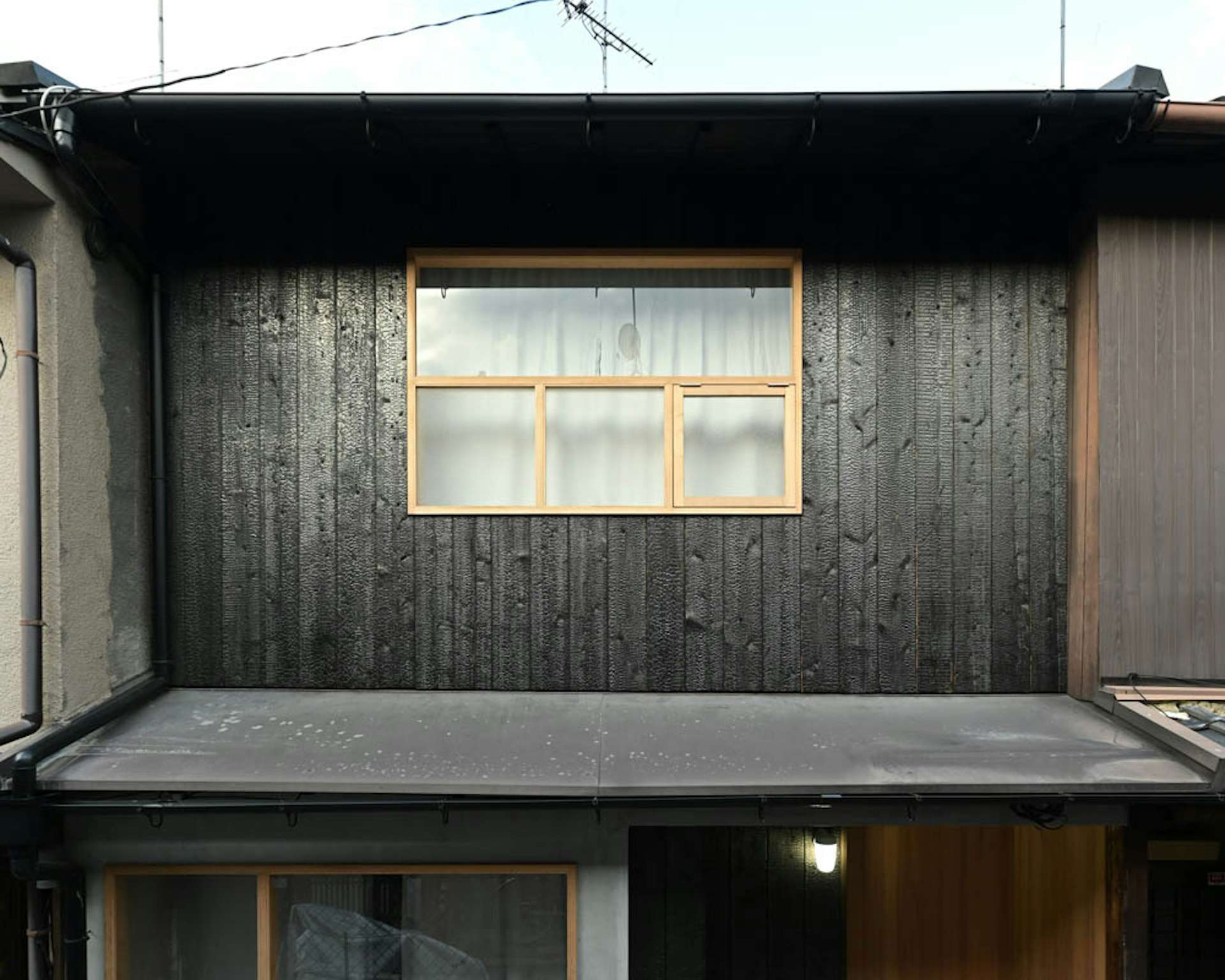 Photo 2 of 14 in In Kyoto, a Revamped Townhouse Clad in Charred Cedar ...