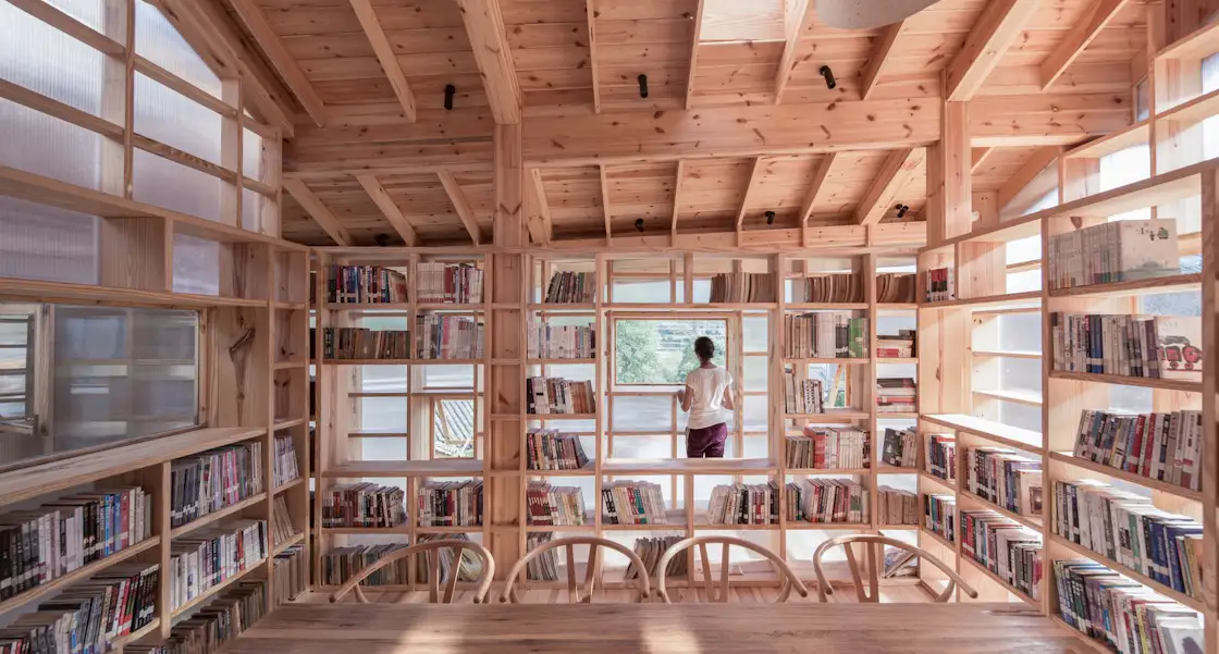 Photo 2 of 14 in 7 Awe-Inspiring Modern Libraries That Bend the Genre ...