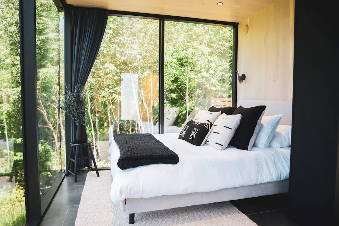 You Can Vanish Into the Woods With These $125K Mirrored Prefabs - Dwell