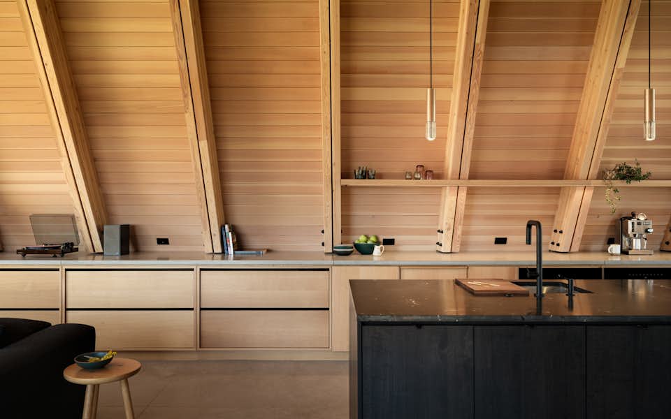 Photo 10 of 18 in Three Tilting A-Frames Form a Net-Zero Mountain ...