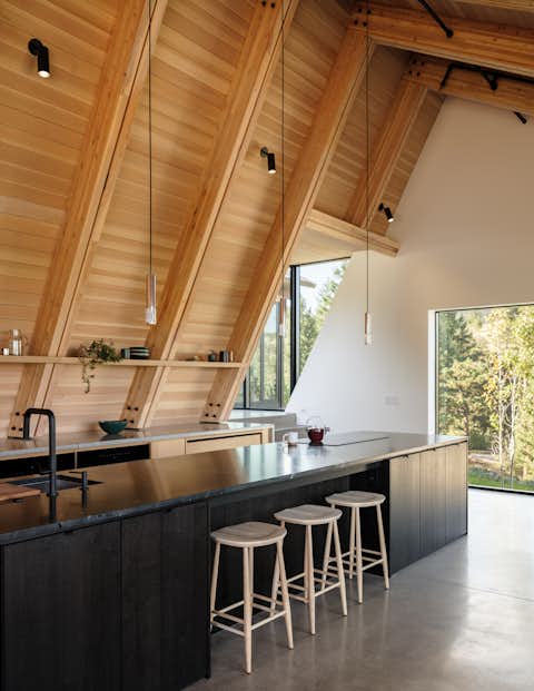 Photo 11 of 18 in Three Tilting A-Frames Form a Net-Zero Mountain ...