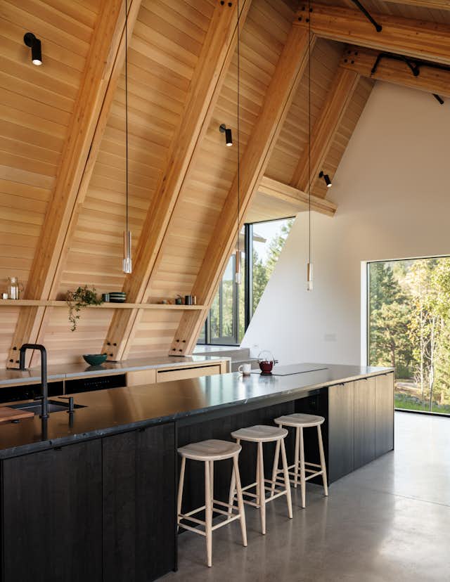 Photo 11 of 18 in Three Tilting A-Frames Form a Net-Zero Mountain ...