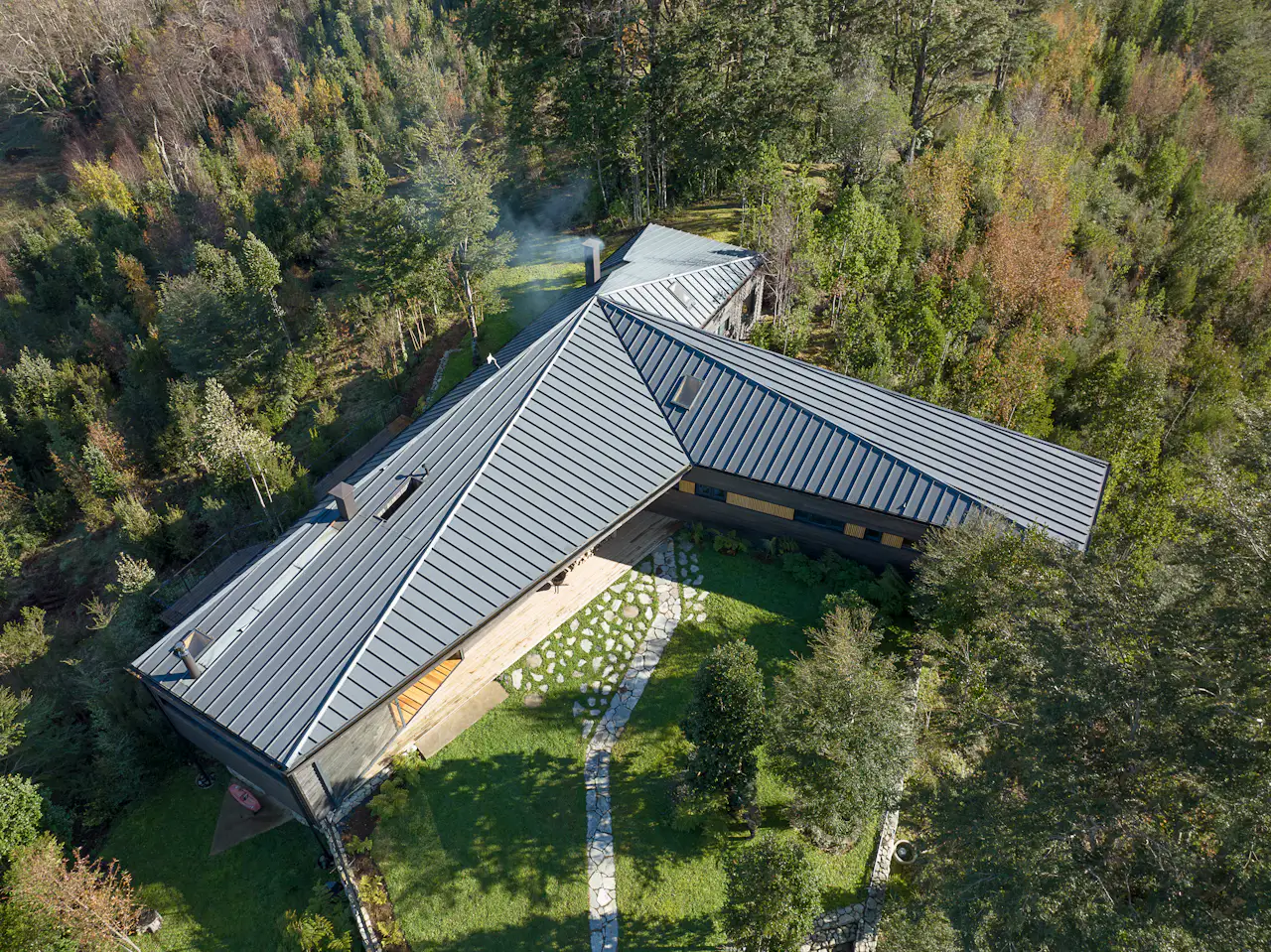 Photo 3 of 17 in A T-Shaped Cabin Hugs a Forested Hillside in Chile - Dwell
