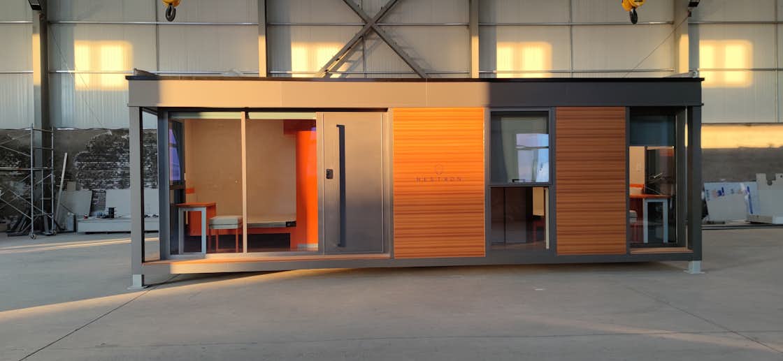 This Wood-Wrapped Prefab With Built-In Furniture Starts at $55K - Dwell