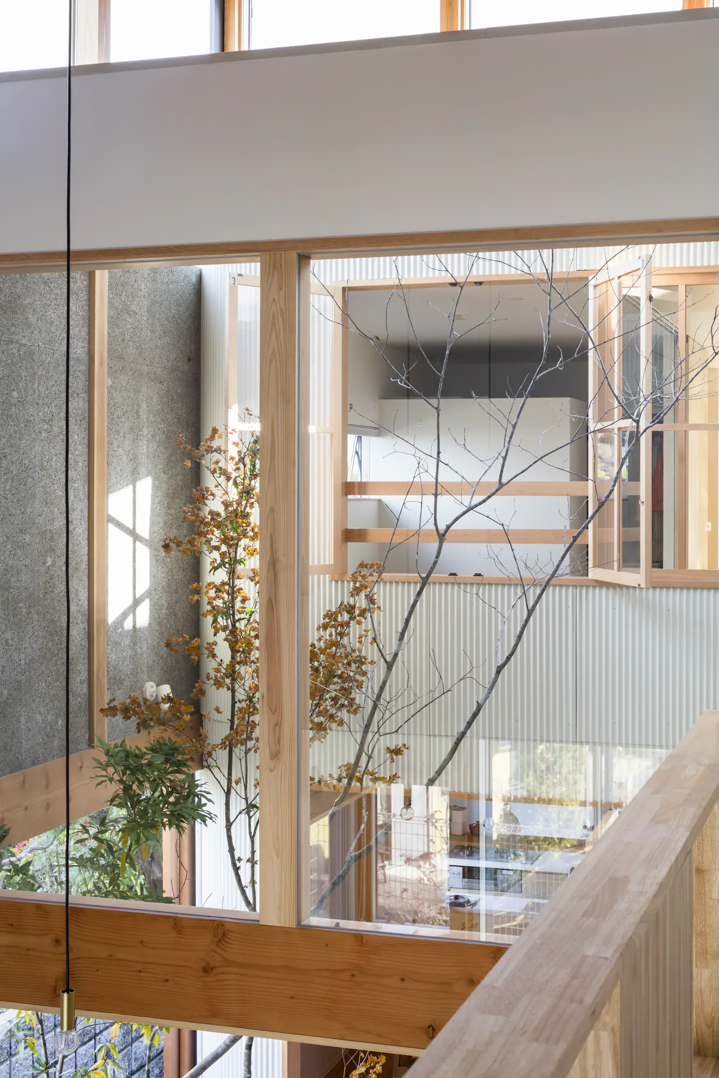 This Minimalist Japanese Home Pivots Around an Indoor Garden - Dwell