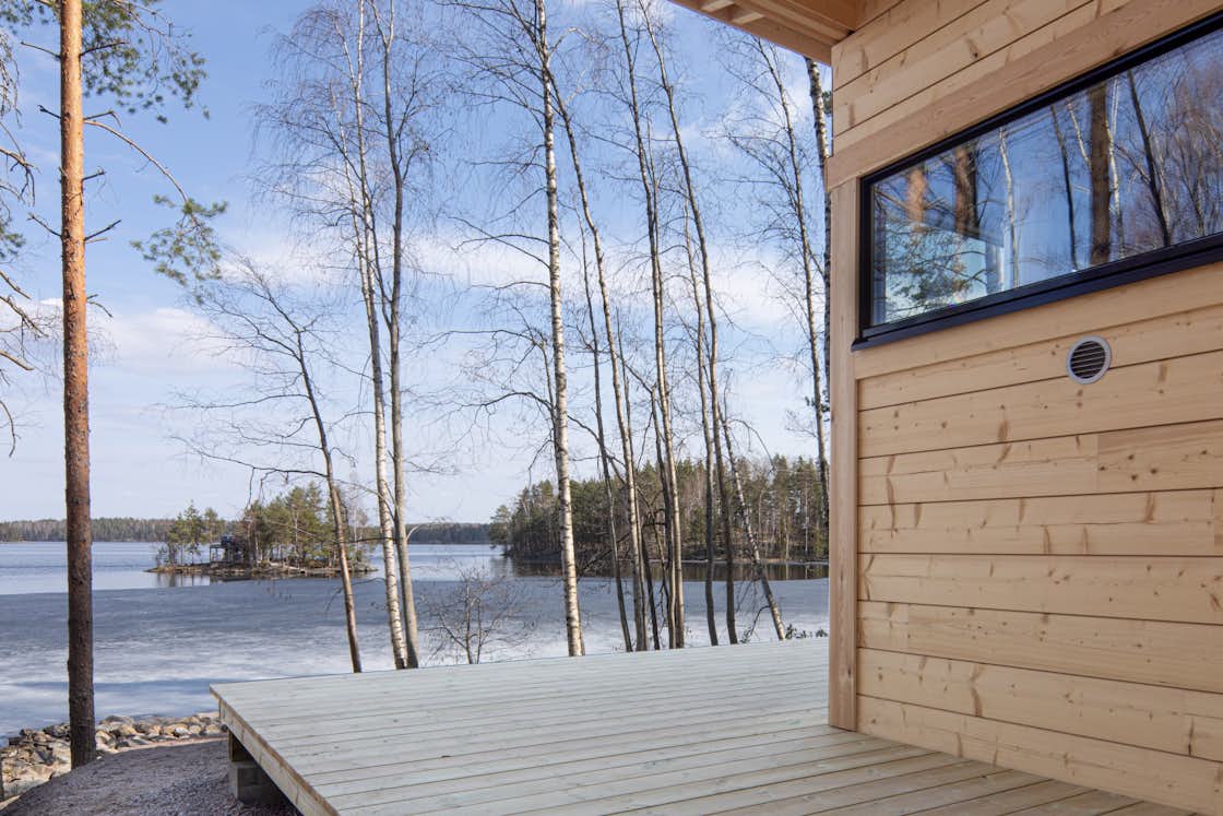 Photo 9 of 9 in A Log Cabin Kit Sauna Is Built Lakeside for a Post ...