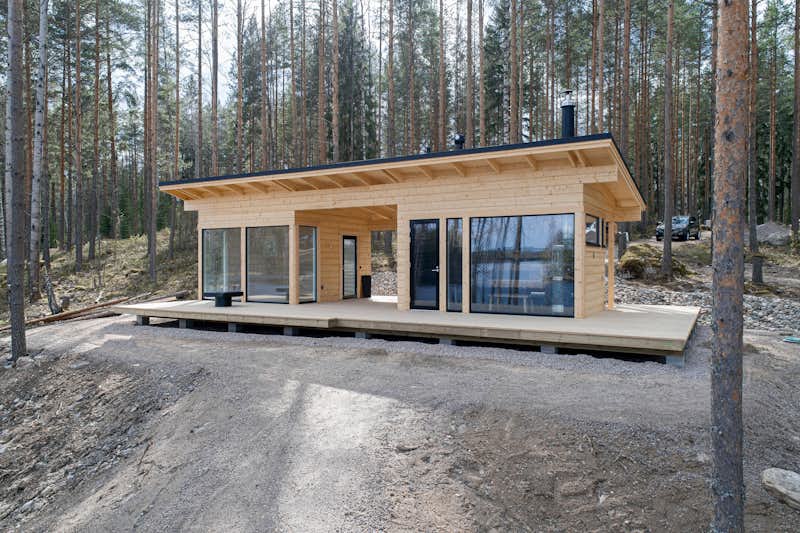 Prefab Log Cabin Sauna by Pluspuu - Dwell