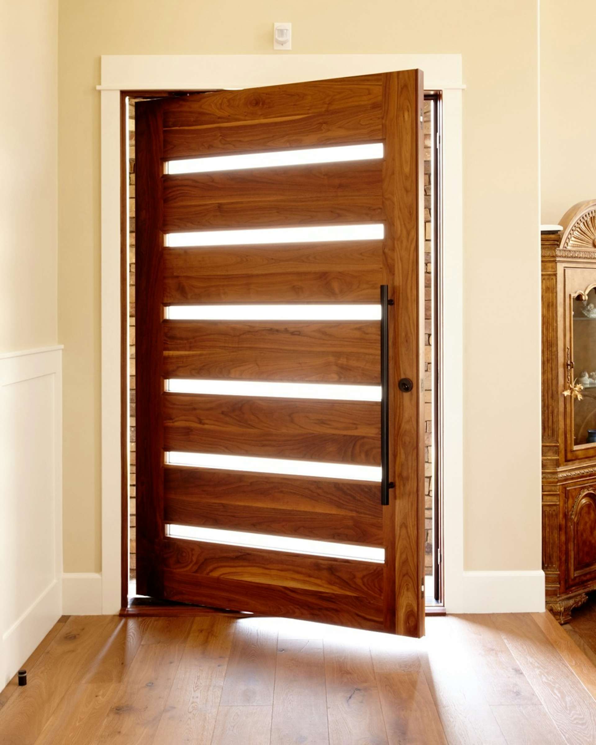 Trends in Pivot Door Design (8 Photos) - Dwell