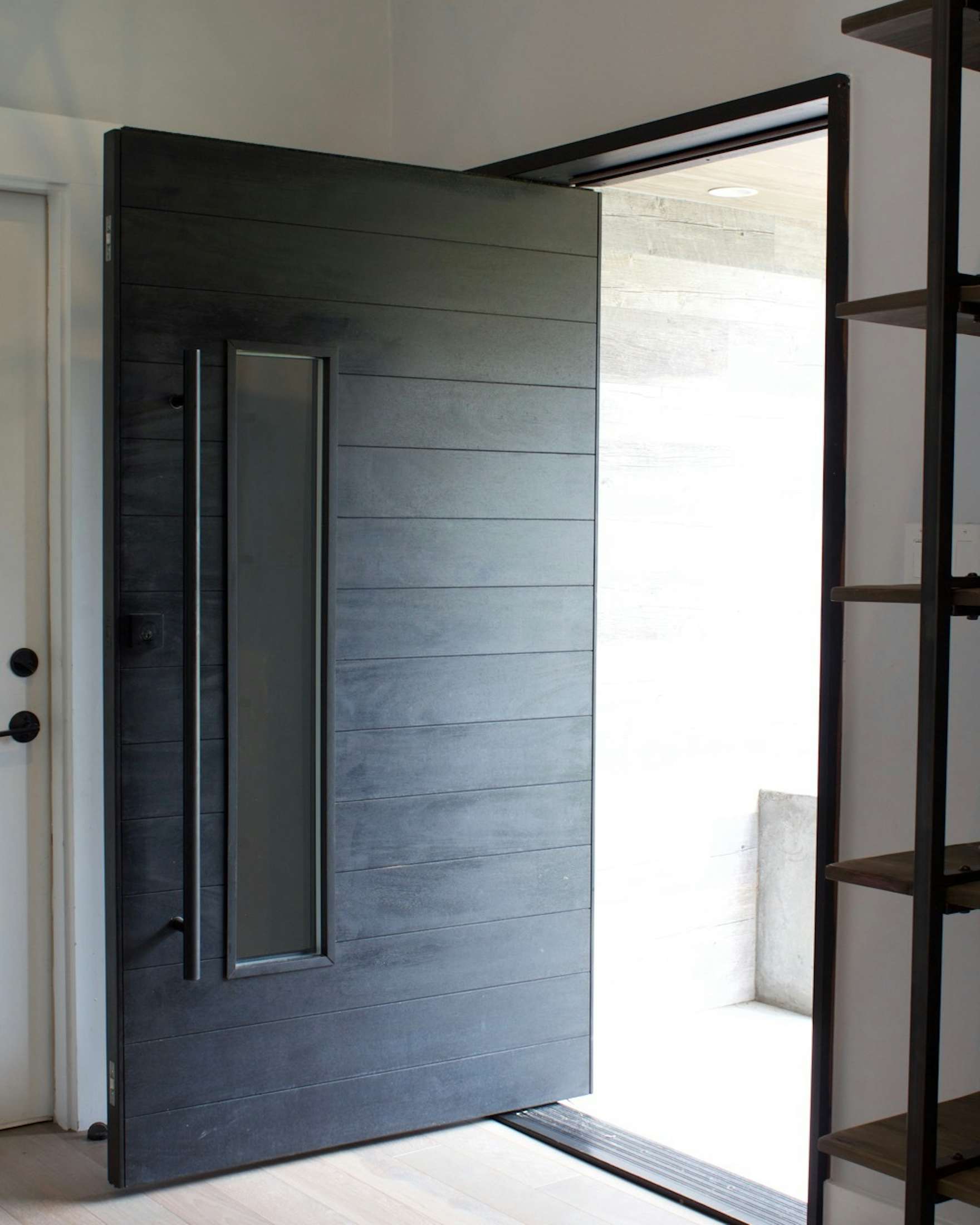 Trends in Pivot Door Design (8 Photos) - Dwell