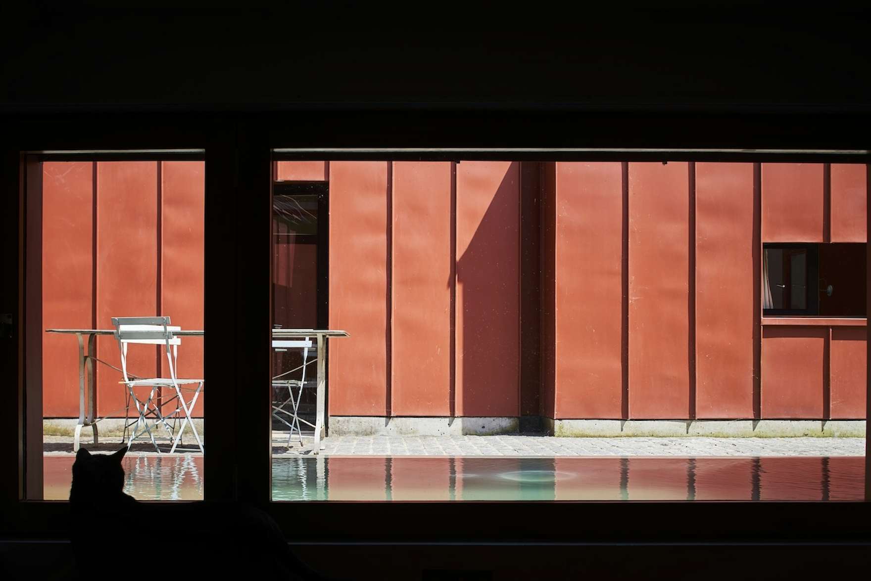 Red Tin House That Makes the Most of Space and Light - Dwell