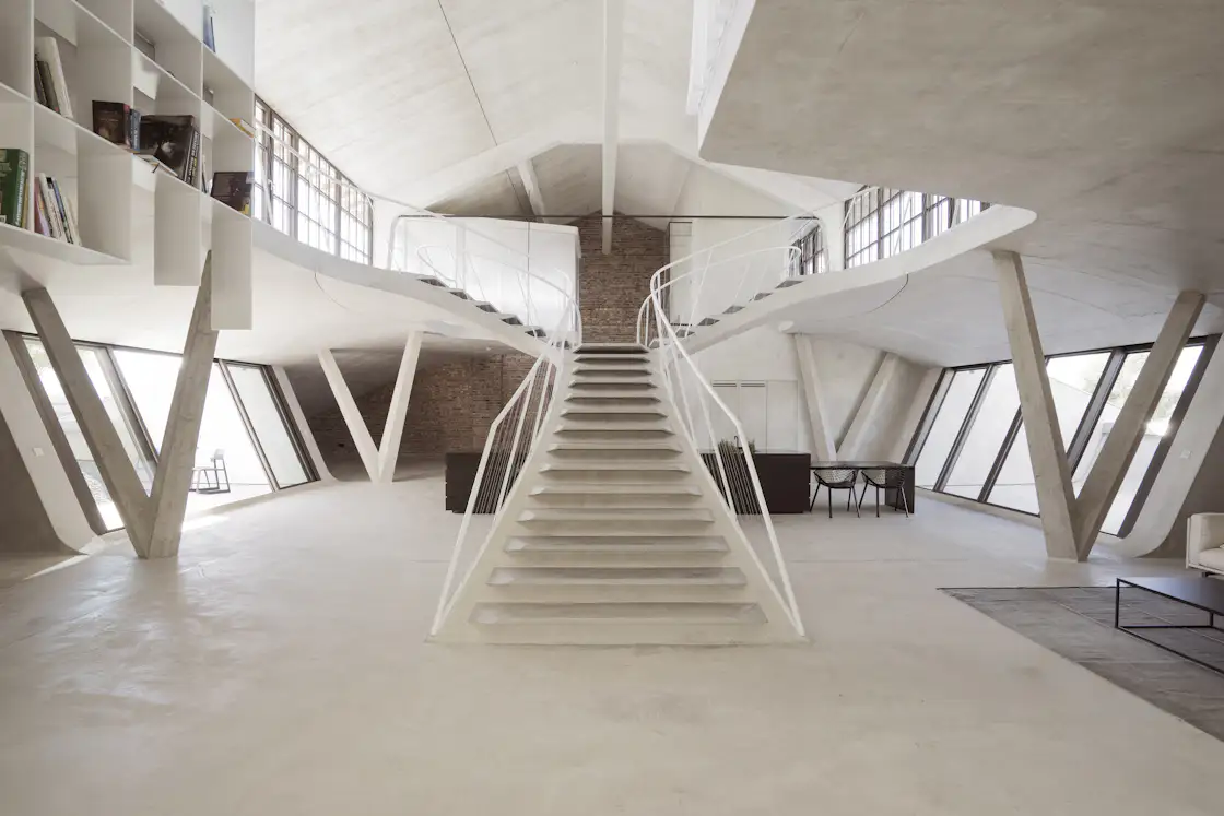 Photo 2 of 18 in This Loft With a Stunning Staircase Looks Like a James ...