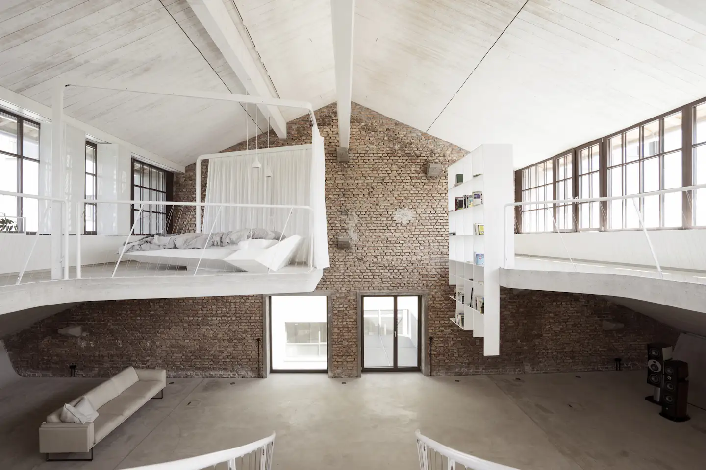 Photo 5 of 18 in This Loft With a Stunning Staircase Looks Like a James ...