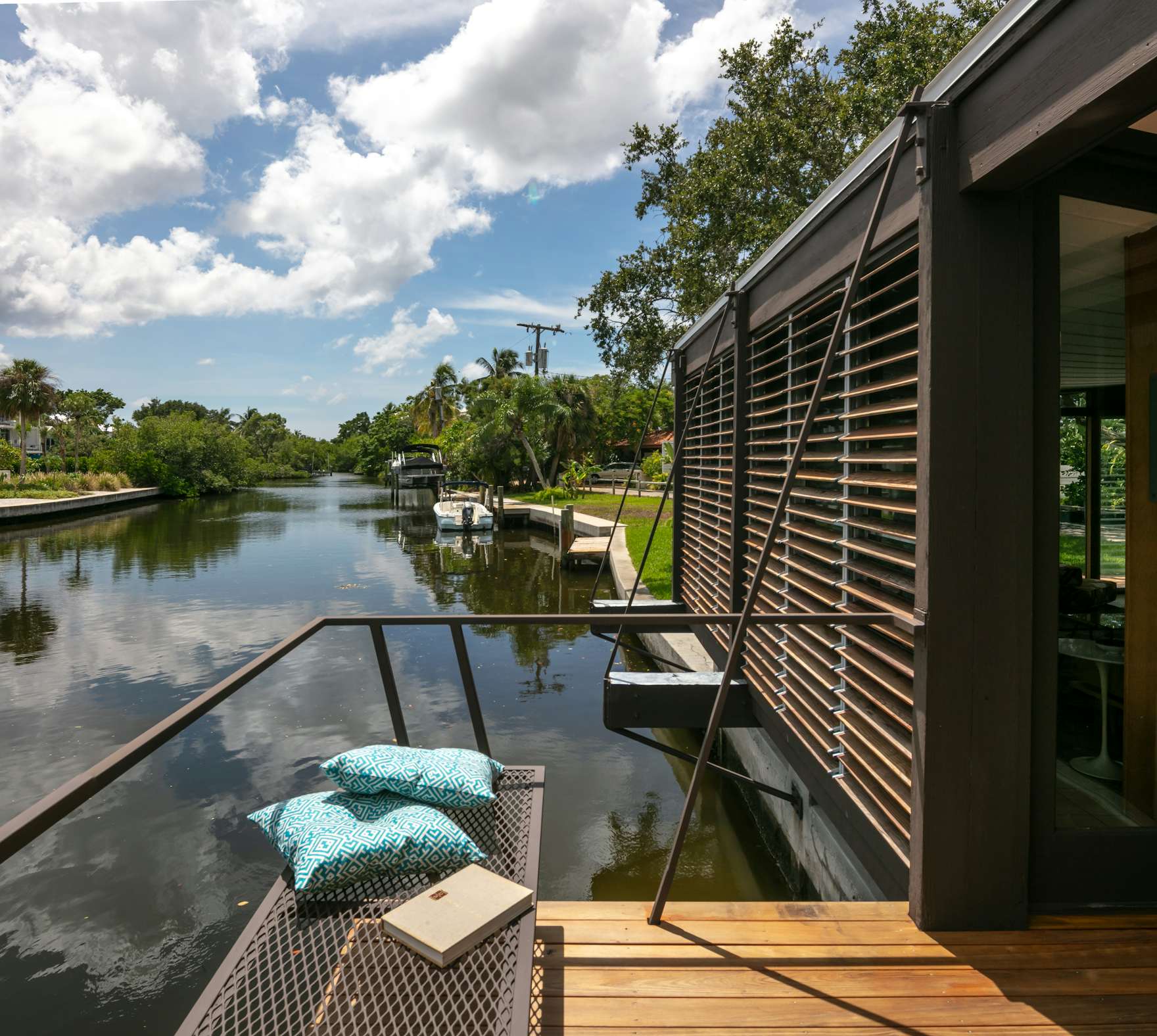 The balcony reaches past the structure and is complete with integrated ...