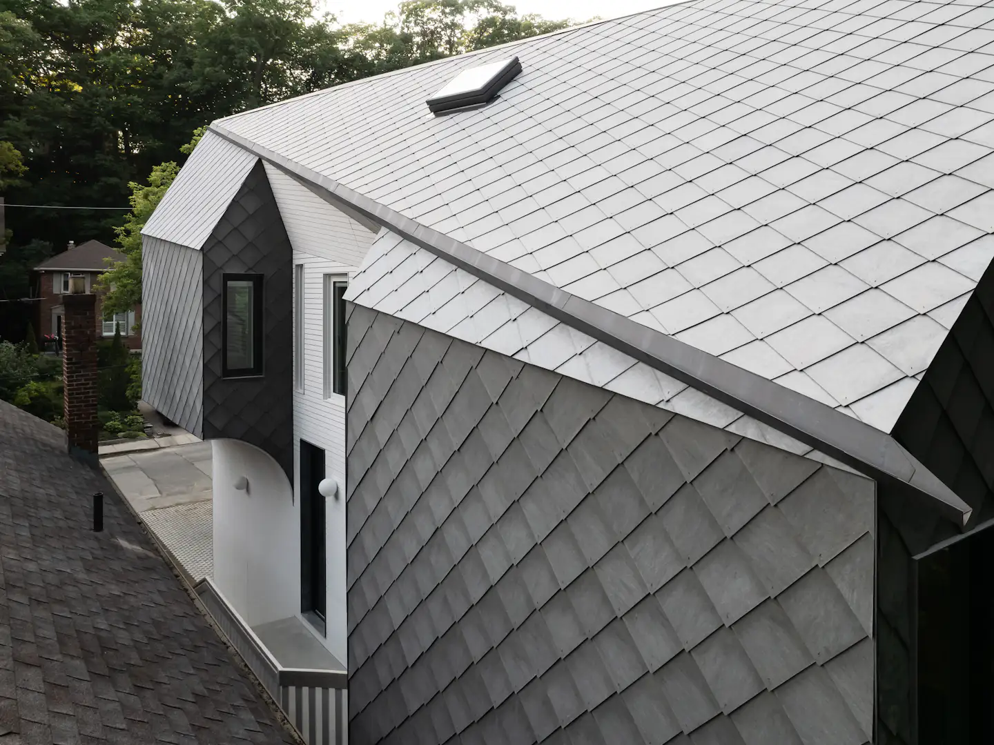 Photo 9 of 10 in How They Pulled It Off: An Asymmetrical Facade Clad in ...