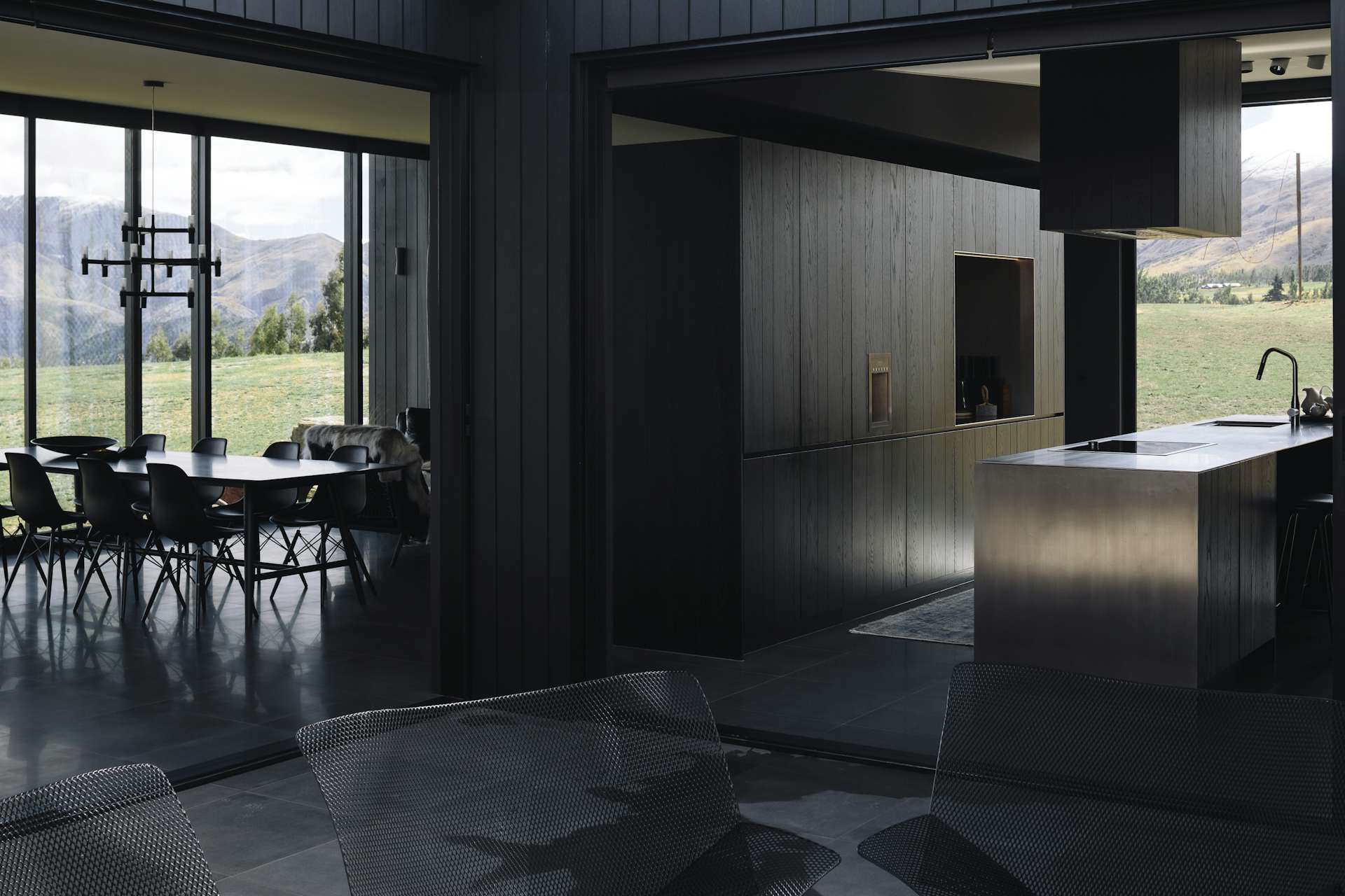 Photo 6 of 12 in A Striking Black House Appears to Float in the New ...