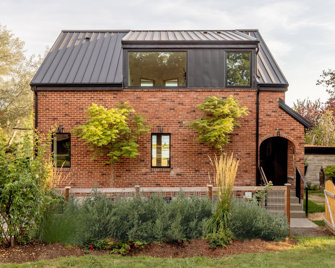 Photos from Before & After: A Couple Crack Open a Cramped Brick House ...