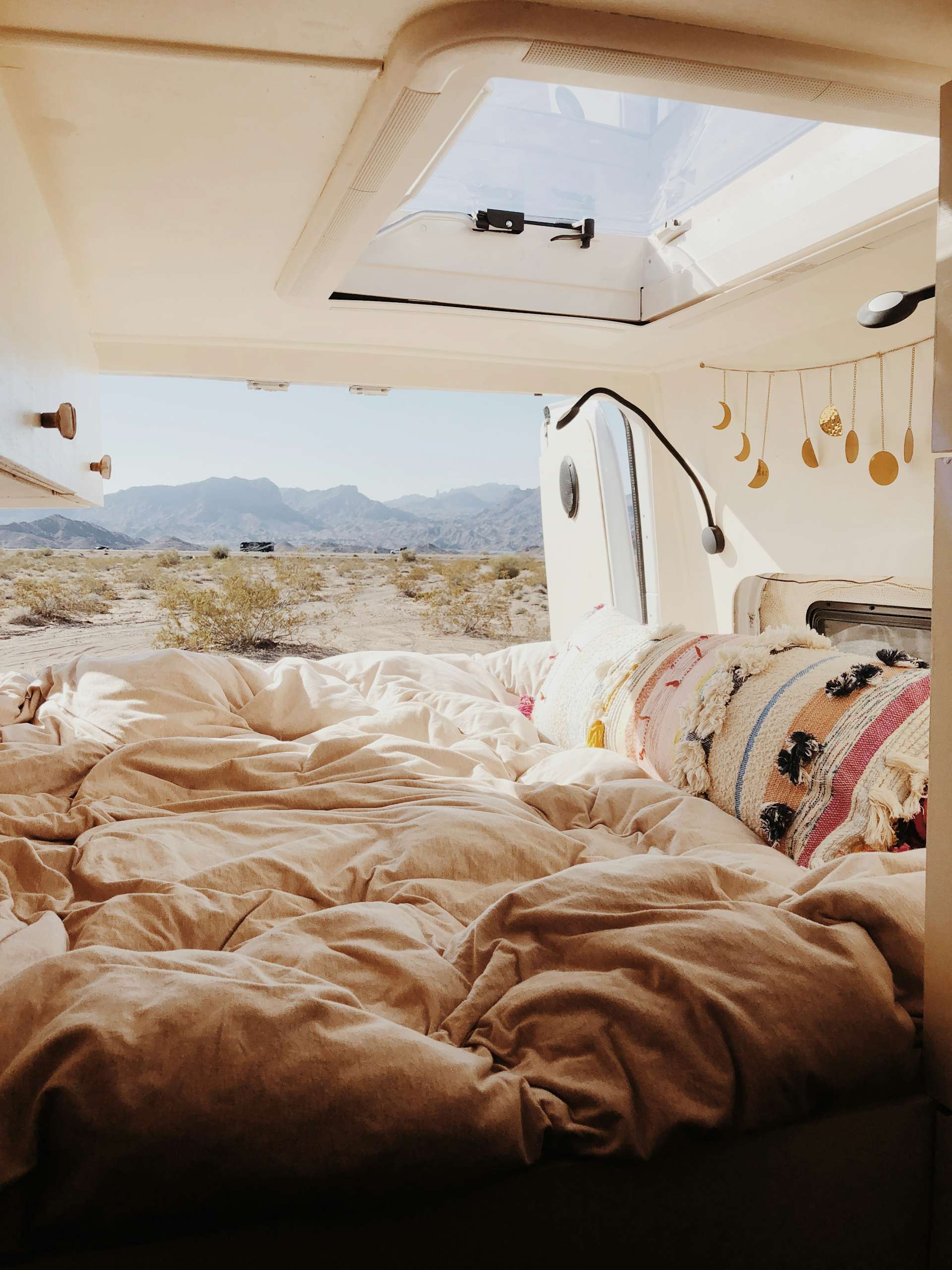 A Creative Duo Turns a Sprinter Van Into a Dream Home For $23K - Dwell