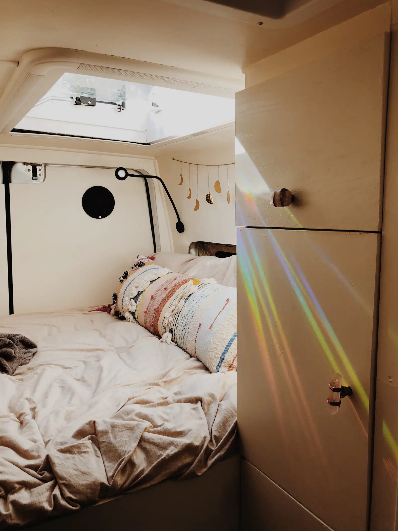 A Creative Duo Turns a Sprinter Van Into a Dream Home For $23K - Dwell