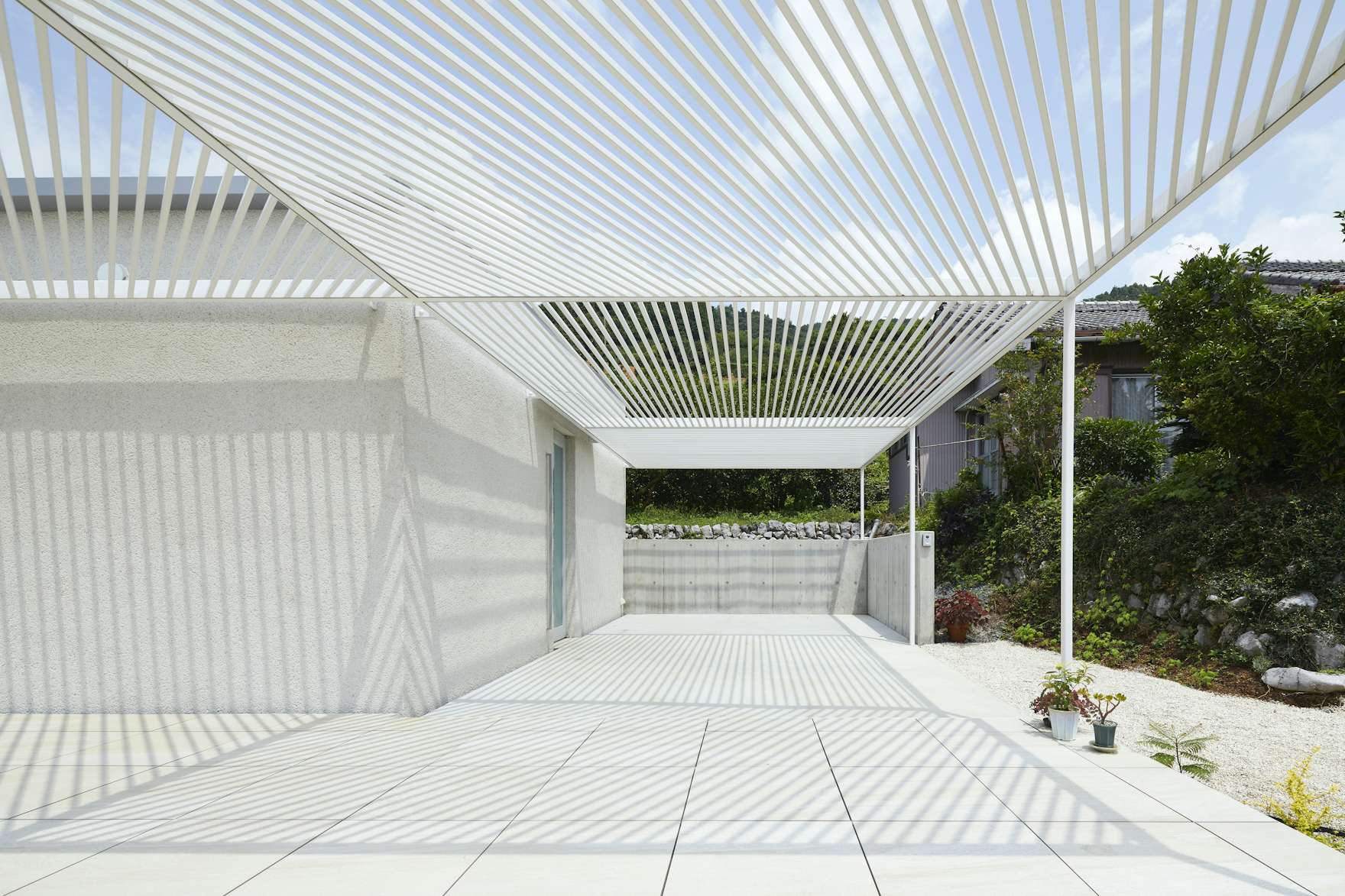 Photo 3 of 9 in A Shaded Veranda Wraps Around This Japanese Dwelling ...
