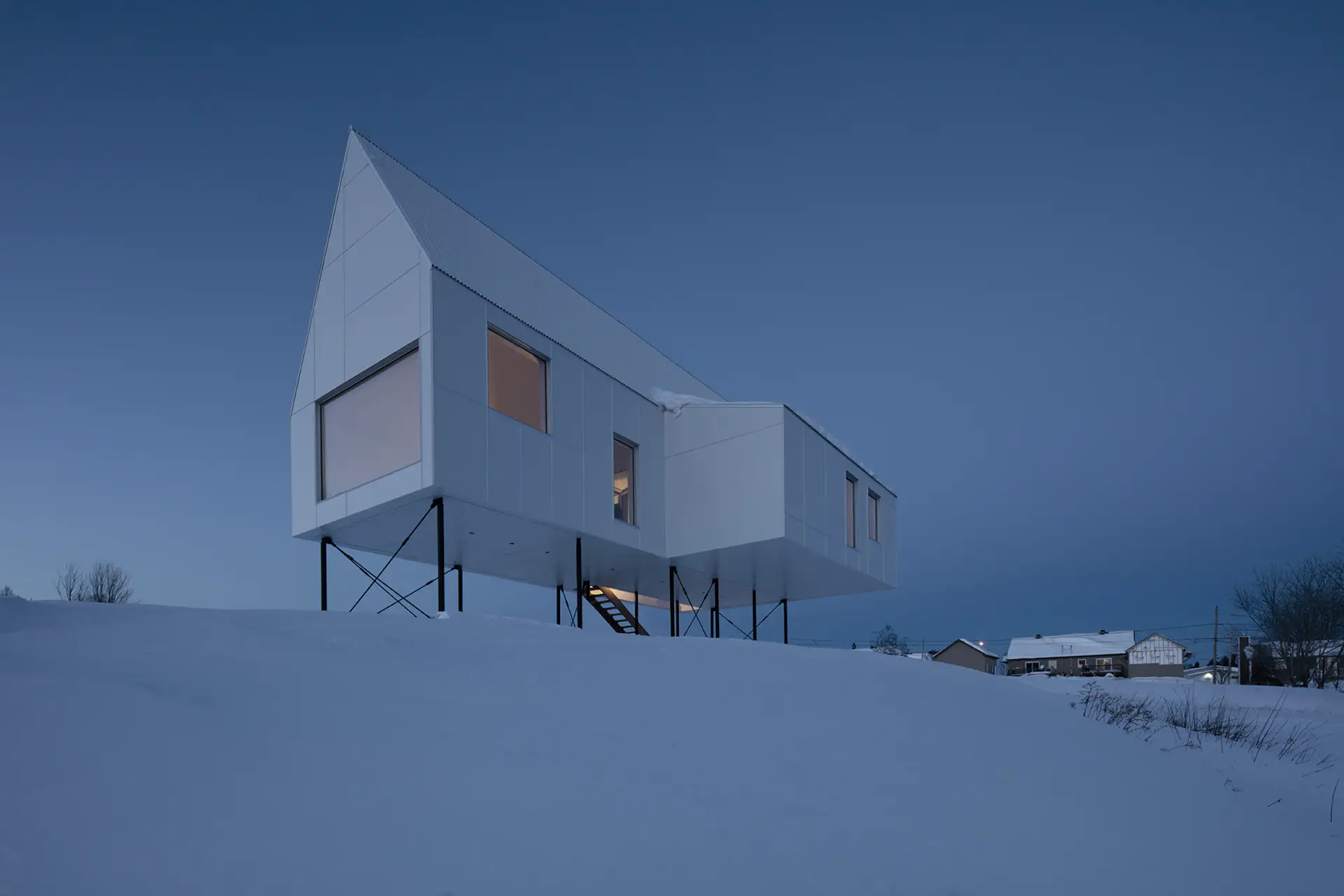 Photo 5 of 7 in A Minimalist Winter Chalet Stands Tall on Stilts - Dwell