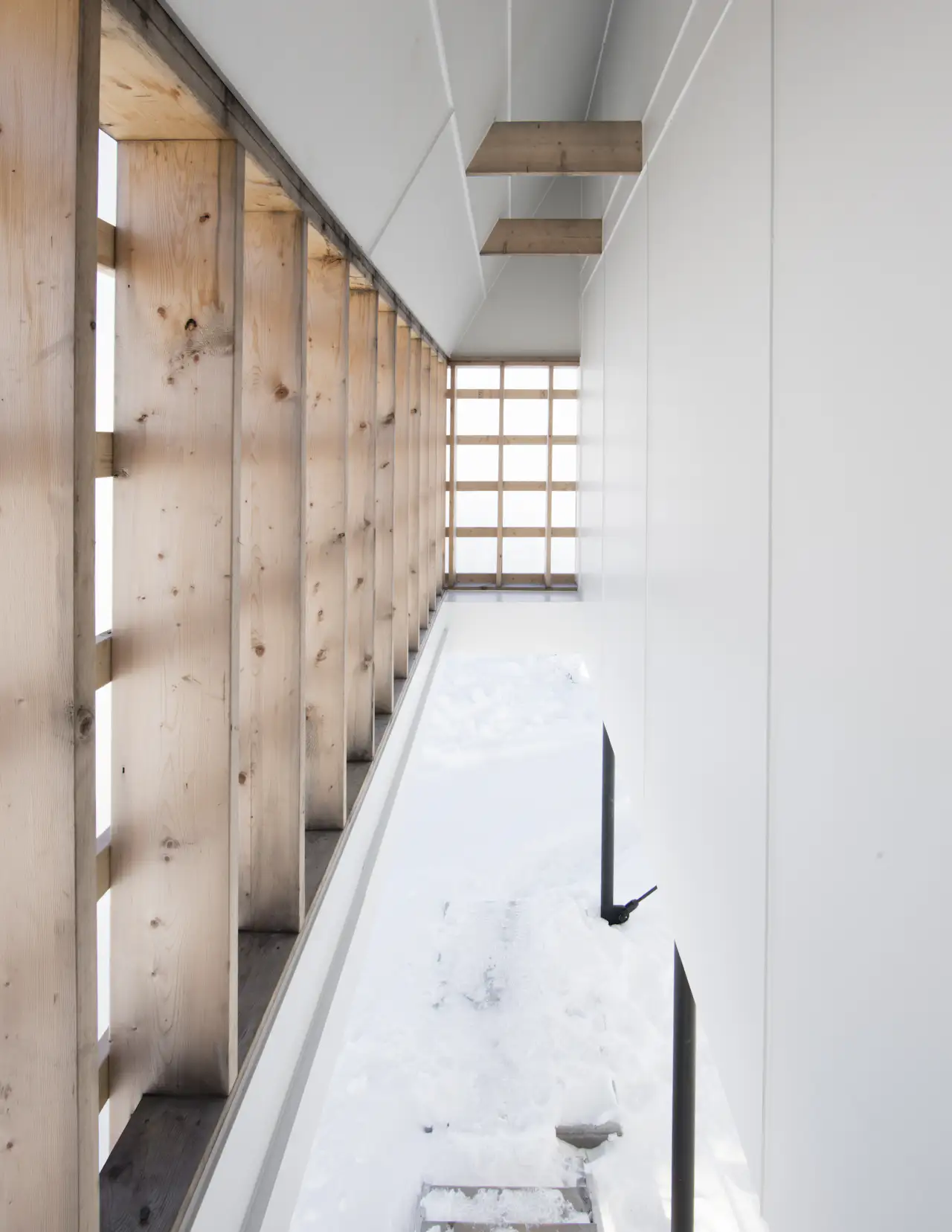 A Minimalist Winter Chalet Stands Tall on Stilts - Dwell