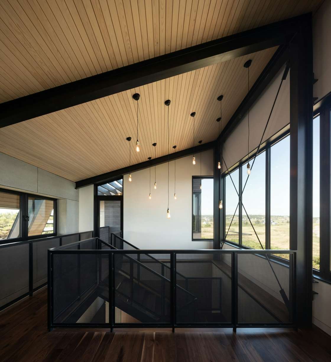 Photo 13 of 19 in A Folded Steel Roof Shields a Fortress-Like Abode in ...