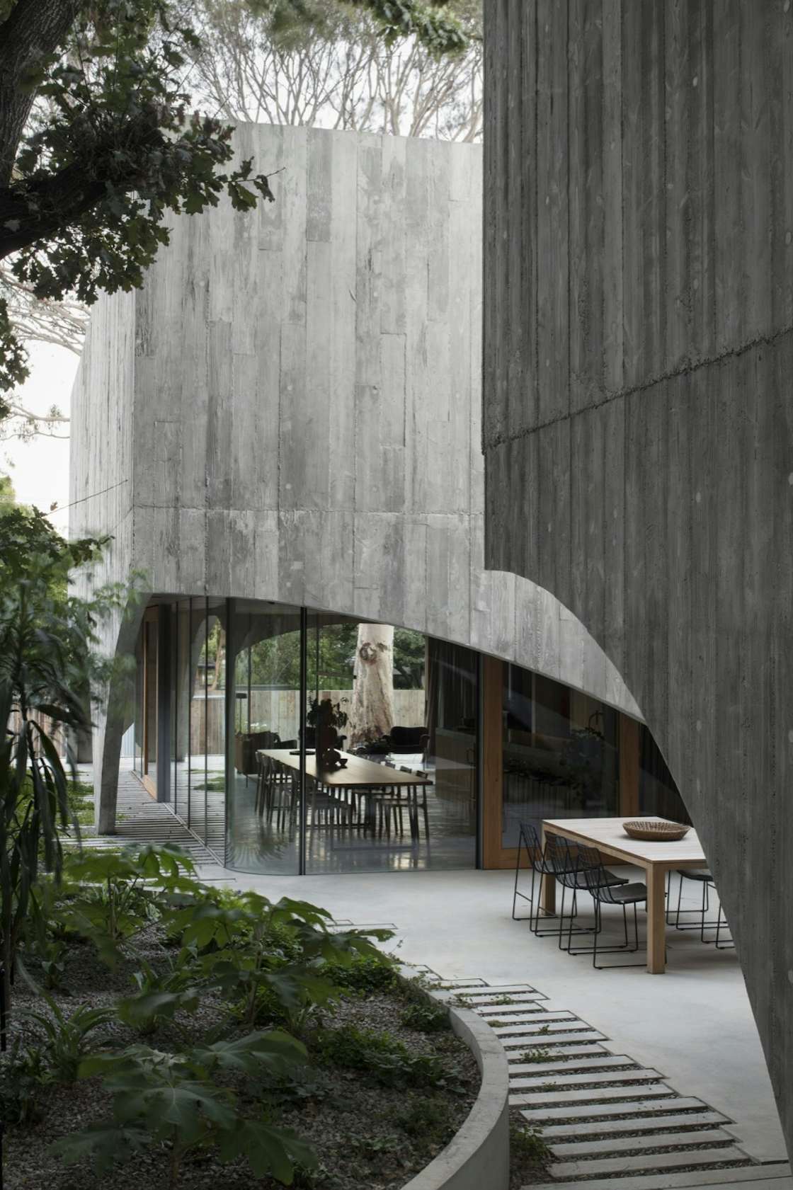 Photo 9 of 24 in Concrete Arches Shroud a Minimalist Forever Home in a ...