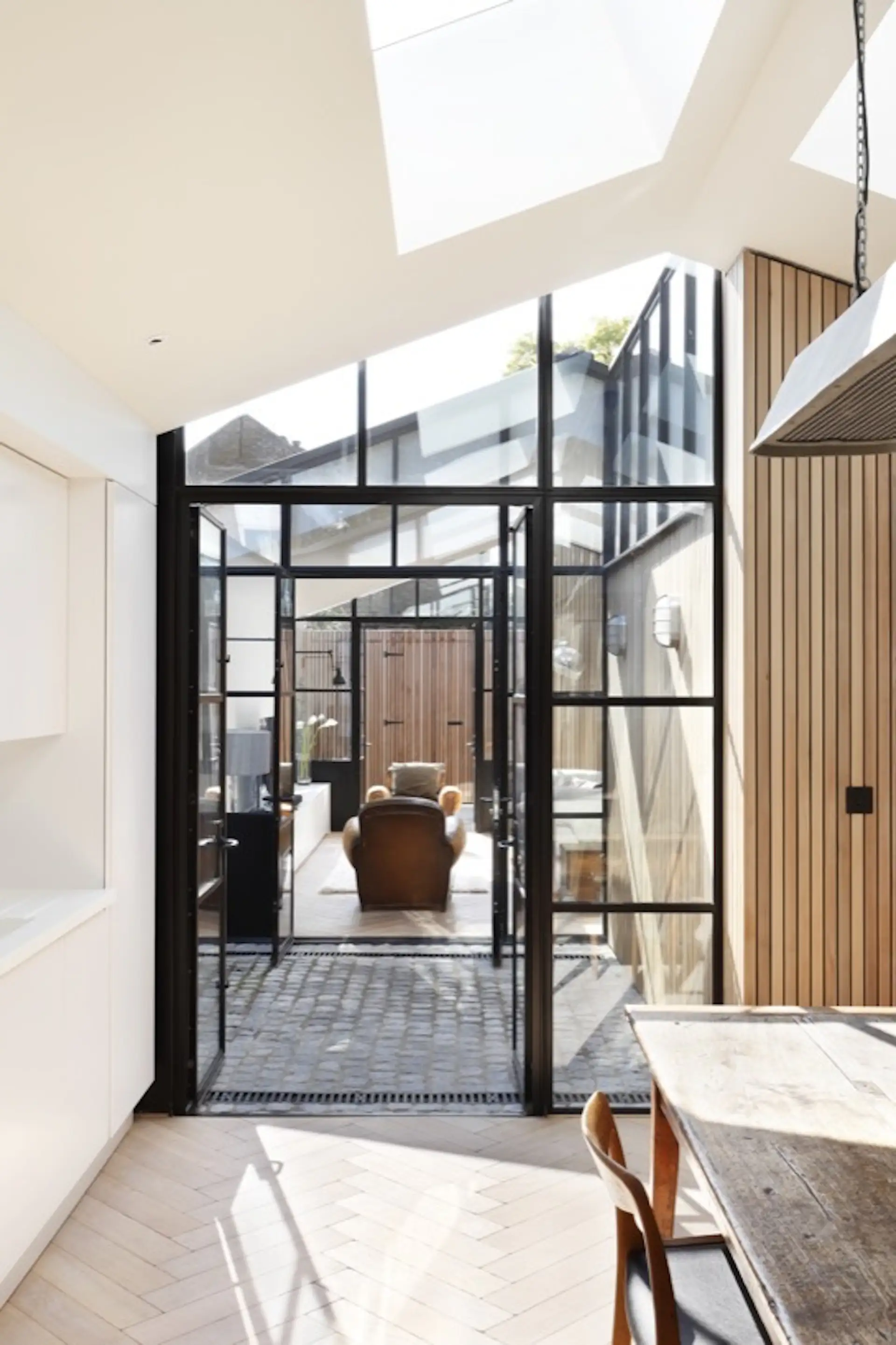 A London Shed Becomes an Airy Home Lit By Three Courtyards - Dwell