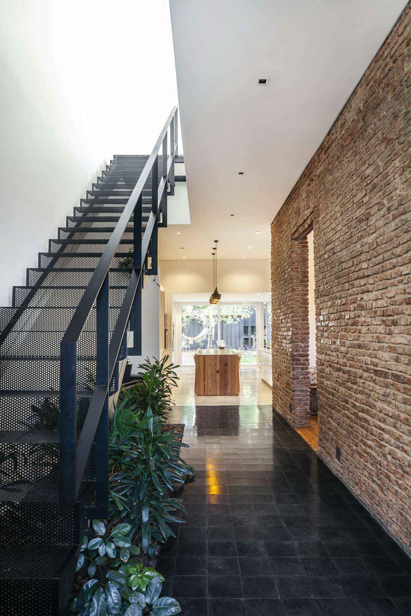 In Argentina, a Brick Home’s New Second Story Feels Weightless - Dwell