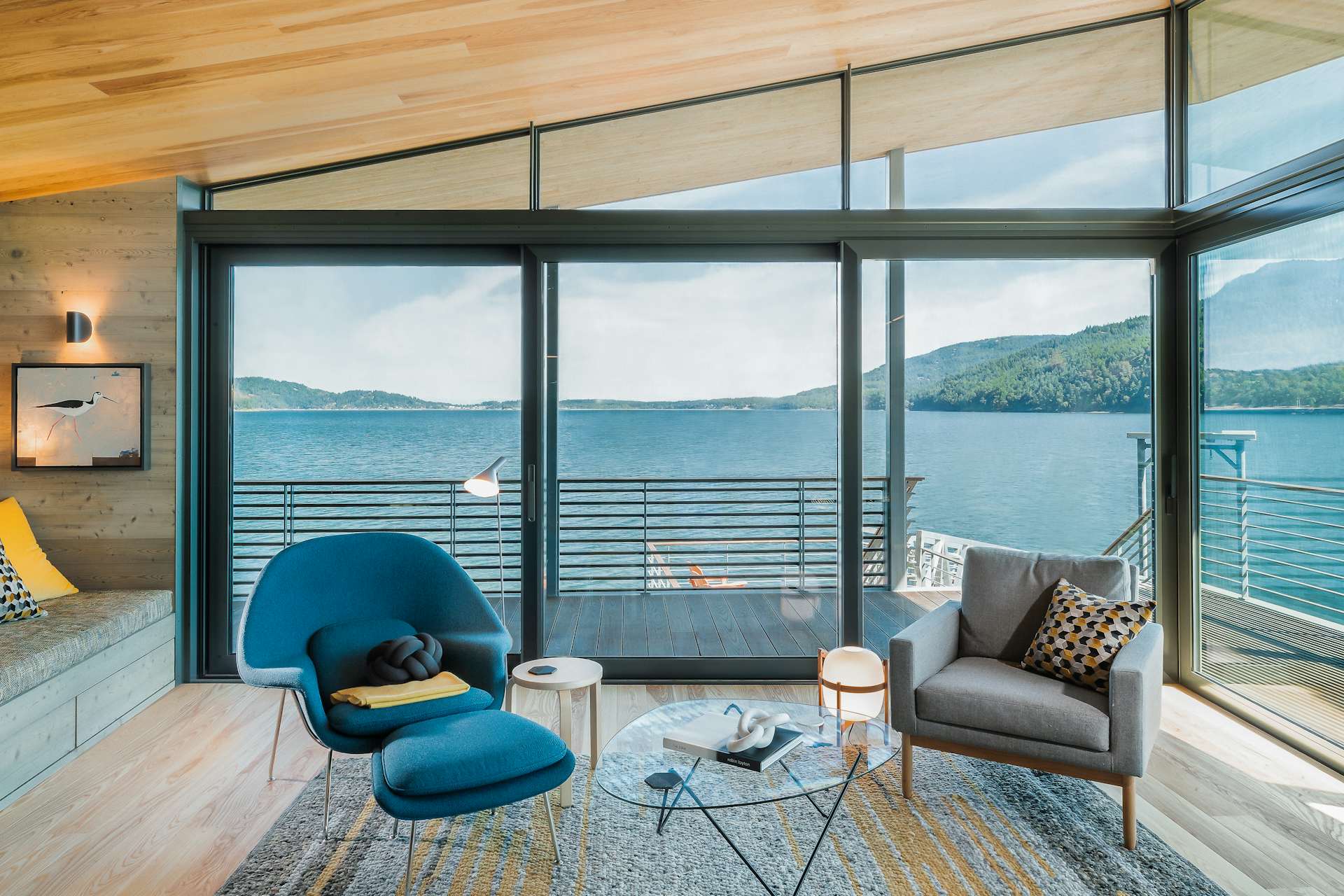 Photo 13 of 16 in A Streamlined Boathouse Perches Above the Water in ...