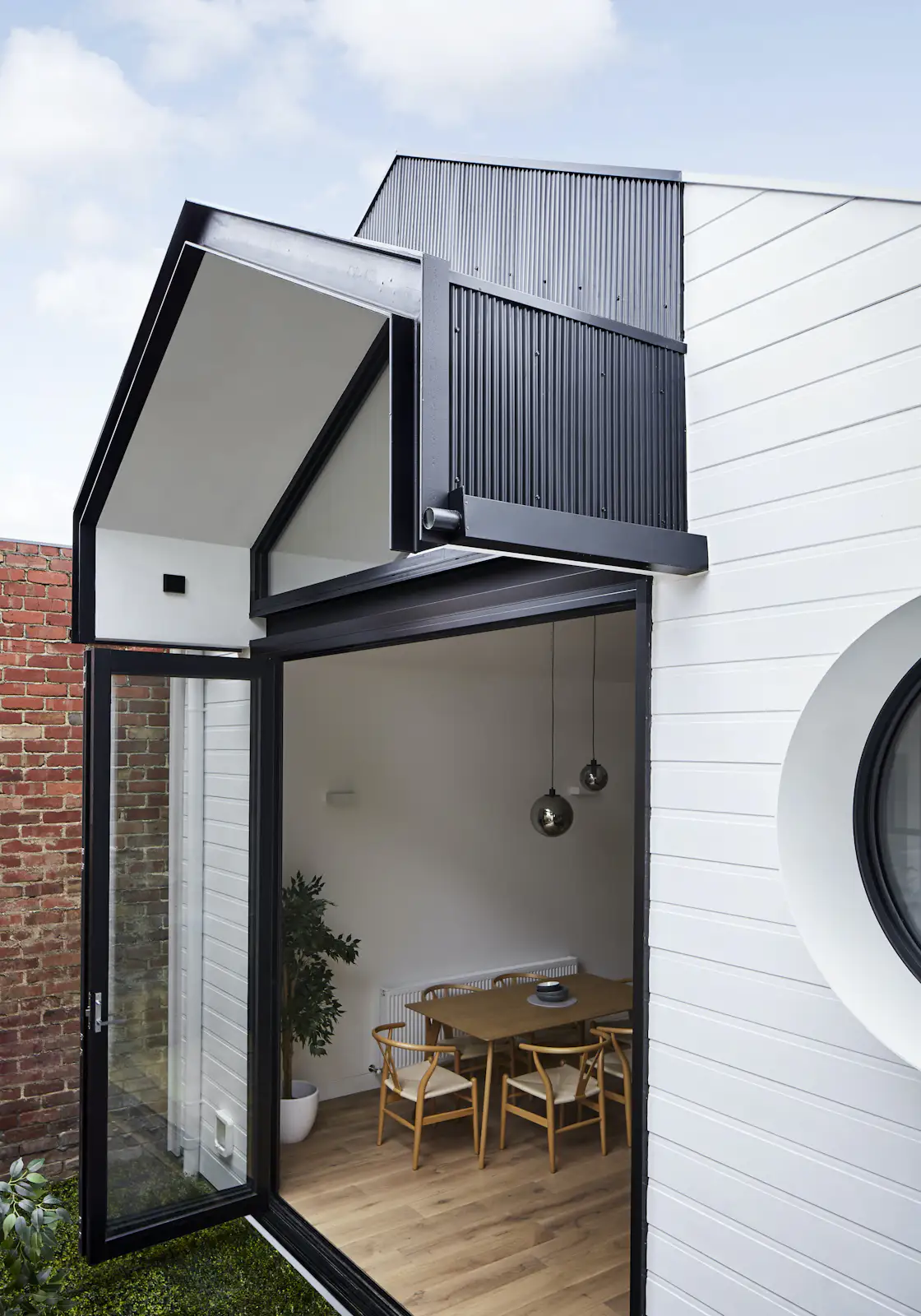 Photo 12 of 17 in This Revamped Terrace House Has a Porthole Window for ...