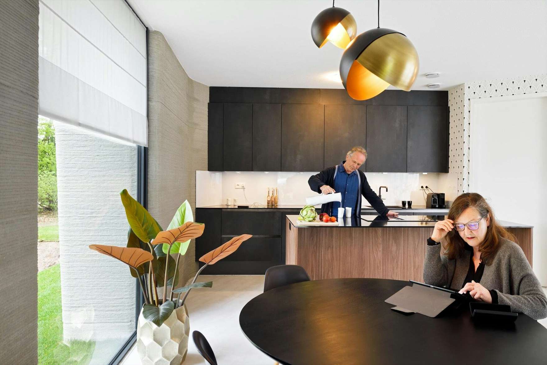 A Dutch Couple Are the First Tenants of This Boulder-Shaped 3D-Printed ...