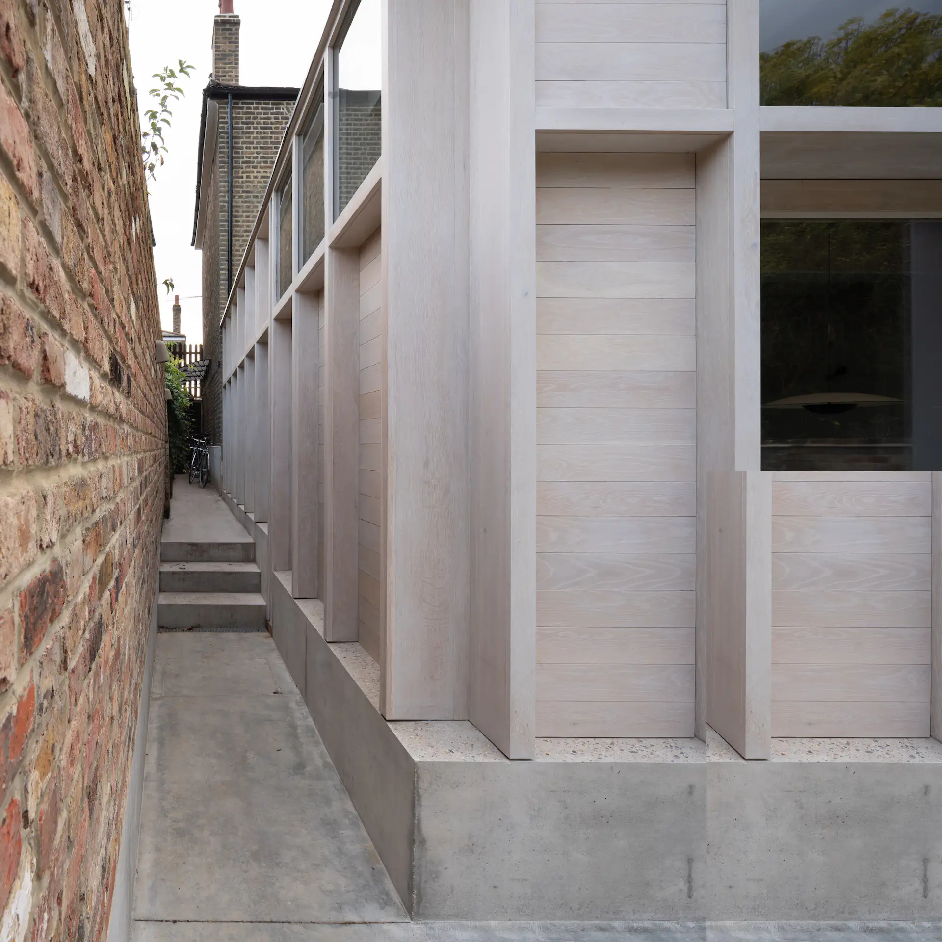 Concrete Plinth House by DGN Studio - Dwell